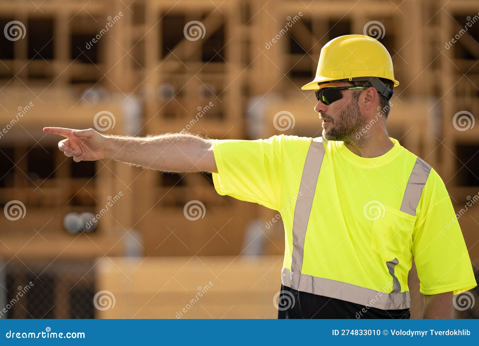 Builder in Helmet on Construction Site. Construction Engineer Worker in ...