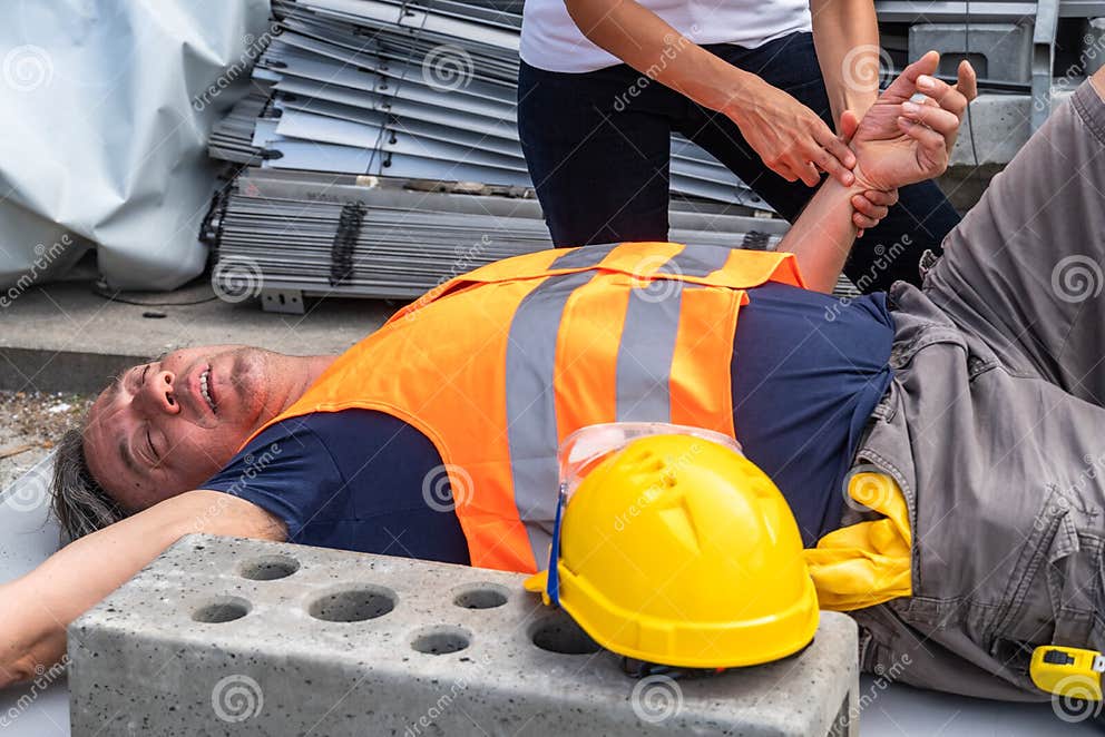 Builder injured at work stock photo. Image of accident - 155939152