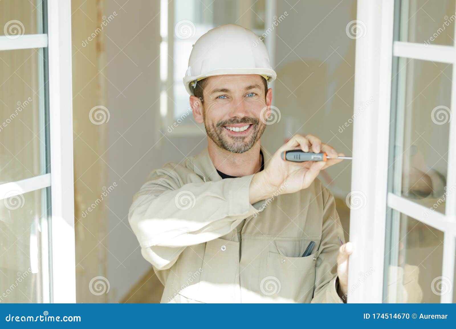 Builder installing window stock photo. Image of blue - 174514670
