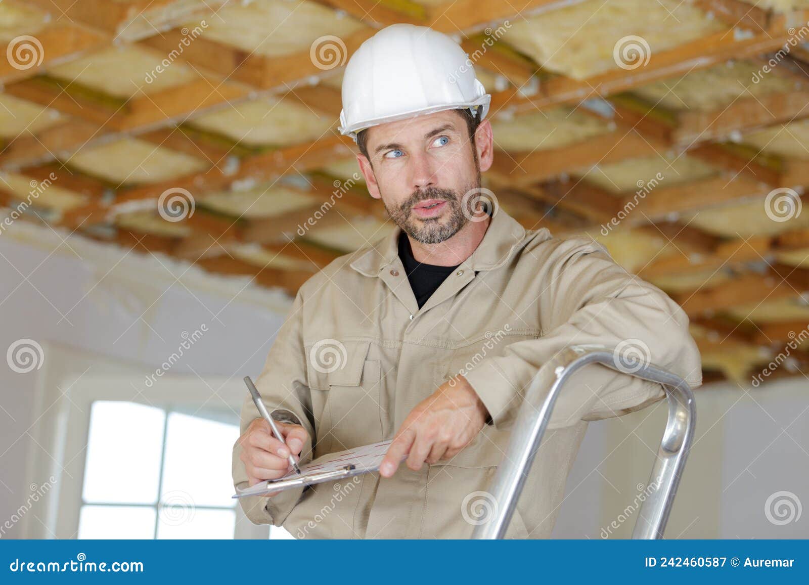 Builder on ladder stock image. Image of construction - 242460587