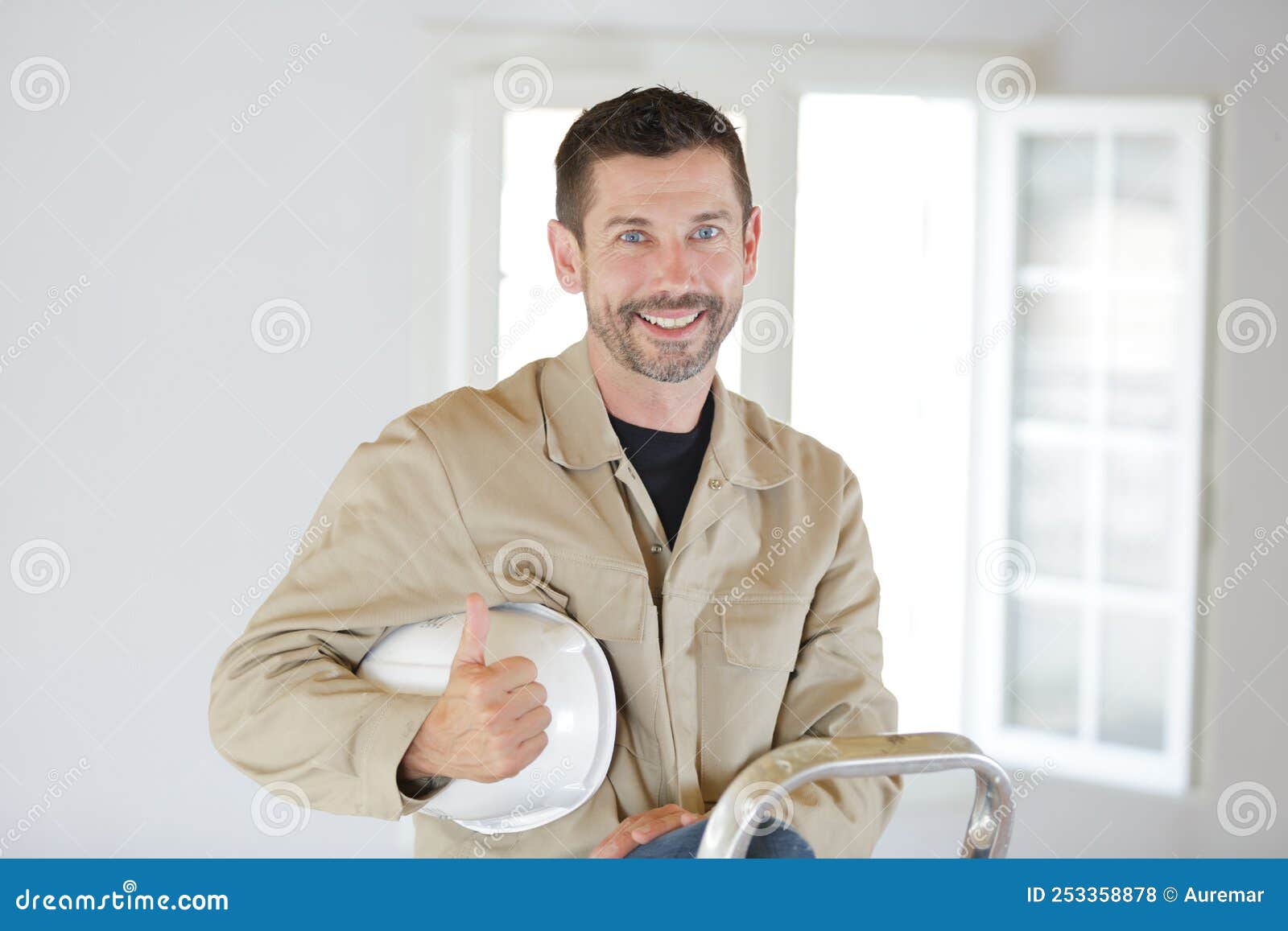 Builder on ladder stock photo. Image of equipment, lifestyle - 253358878