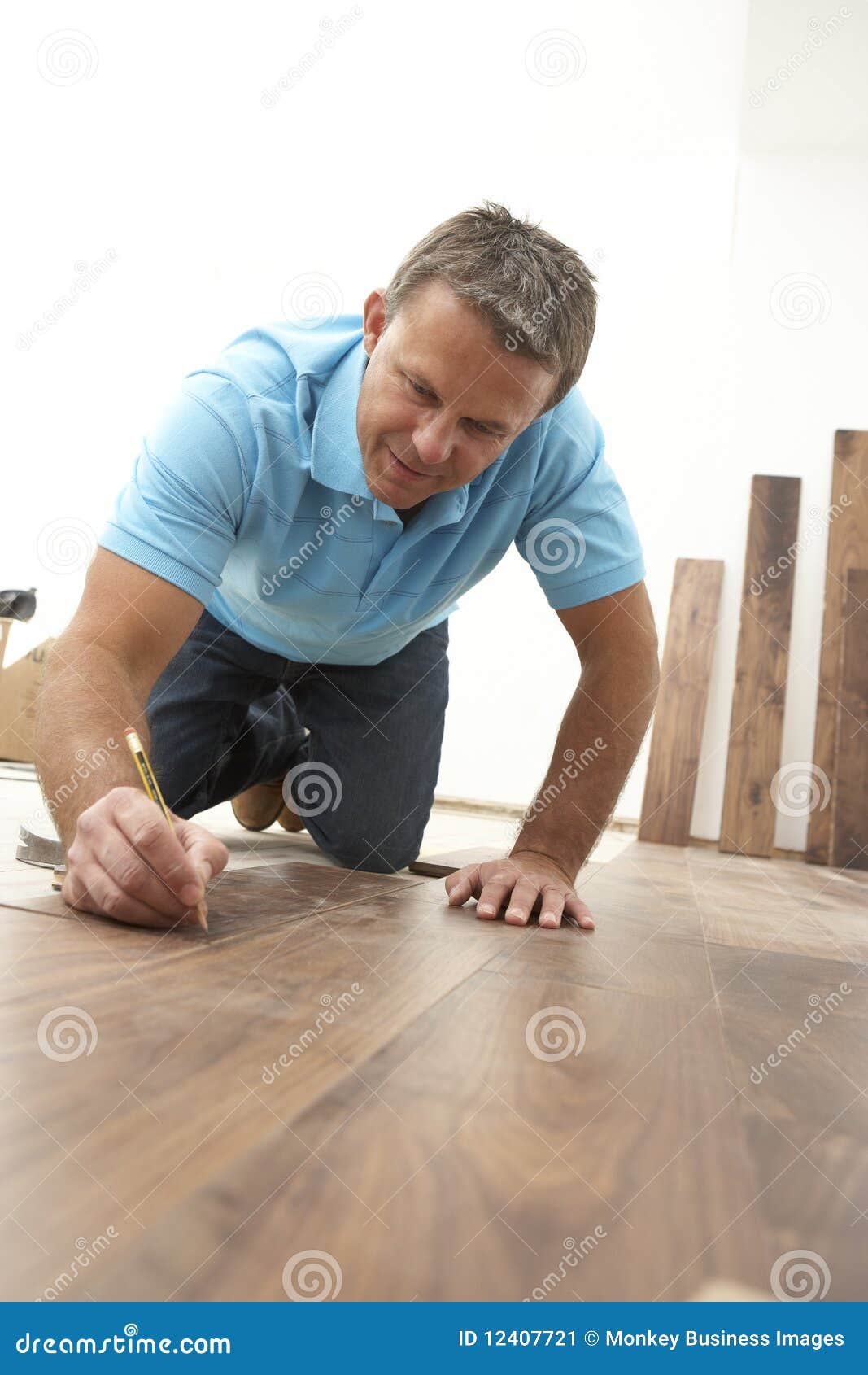 Builder Laying Wooden Flooring Stock Image - Image of hobby, site: 12407721