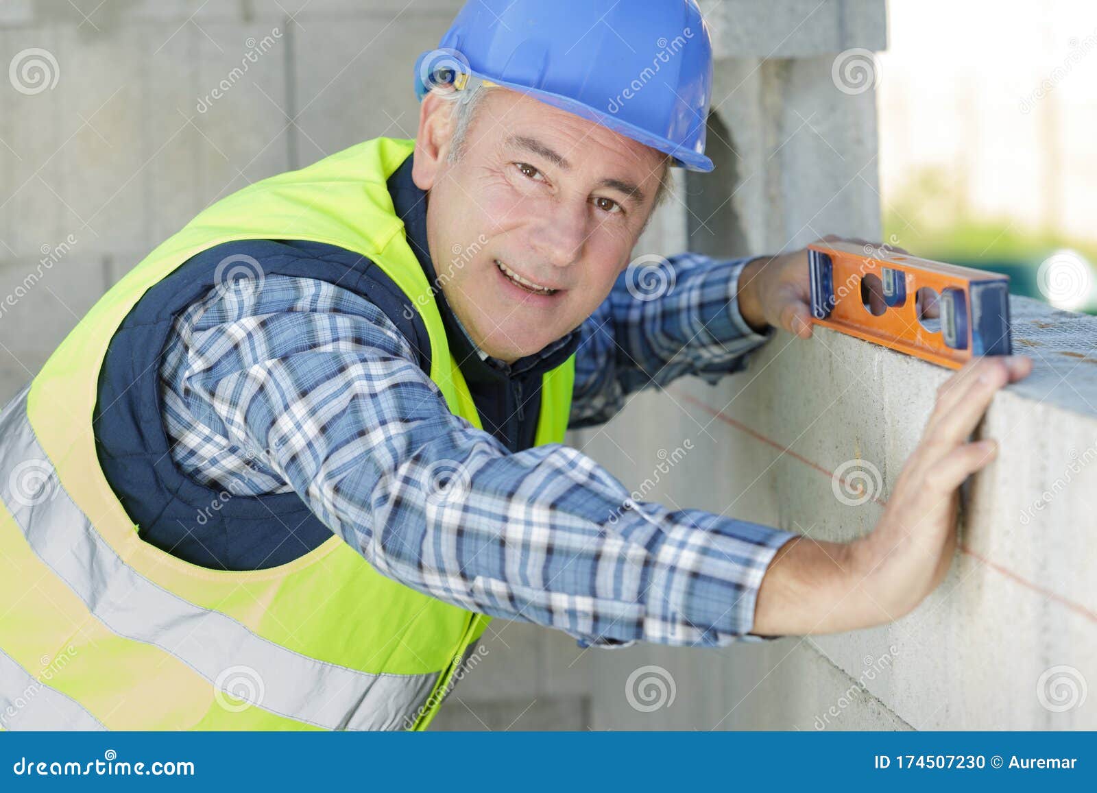 Builder Levelling Stones As he Lays Them Stock Photo - Image of ...