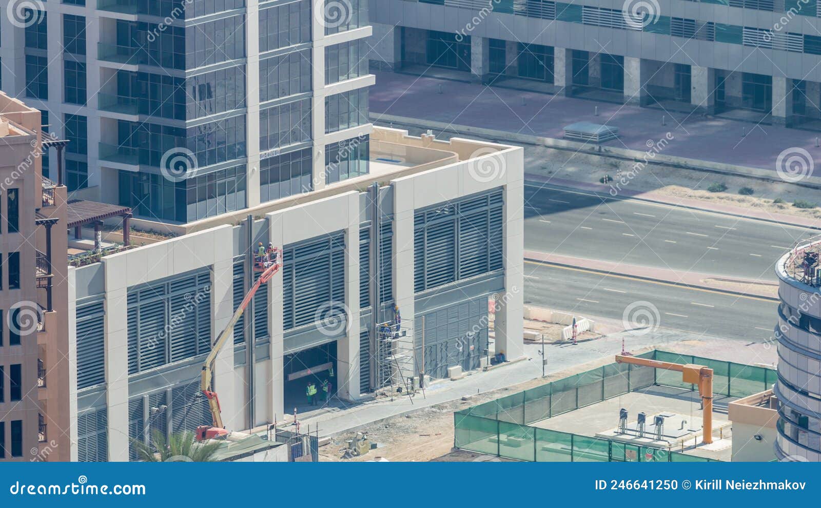 Builder on a Lift Platform on a Construction Site Timelapse. Man at ...