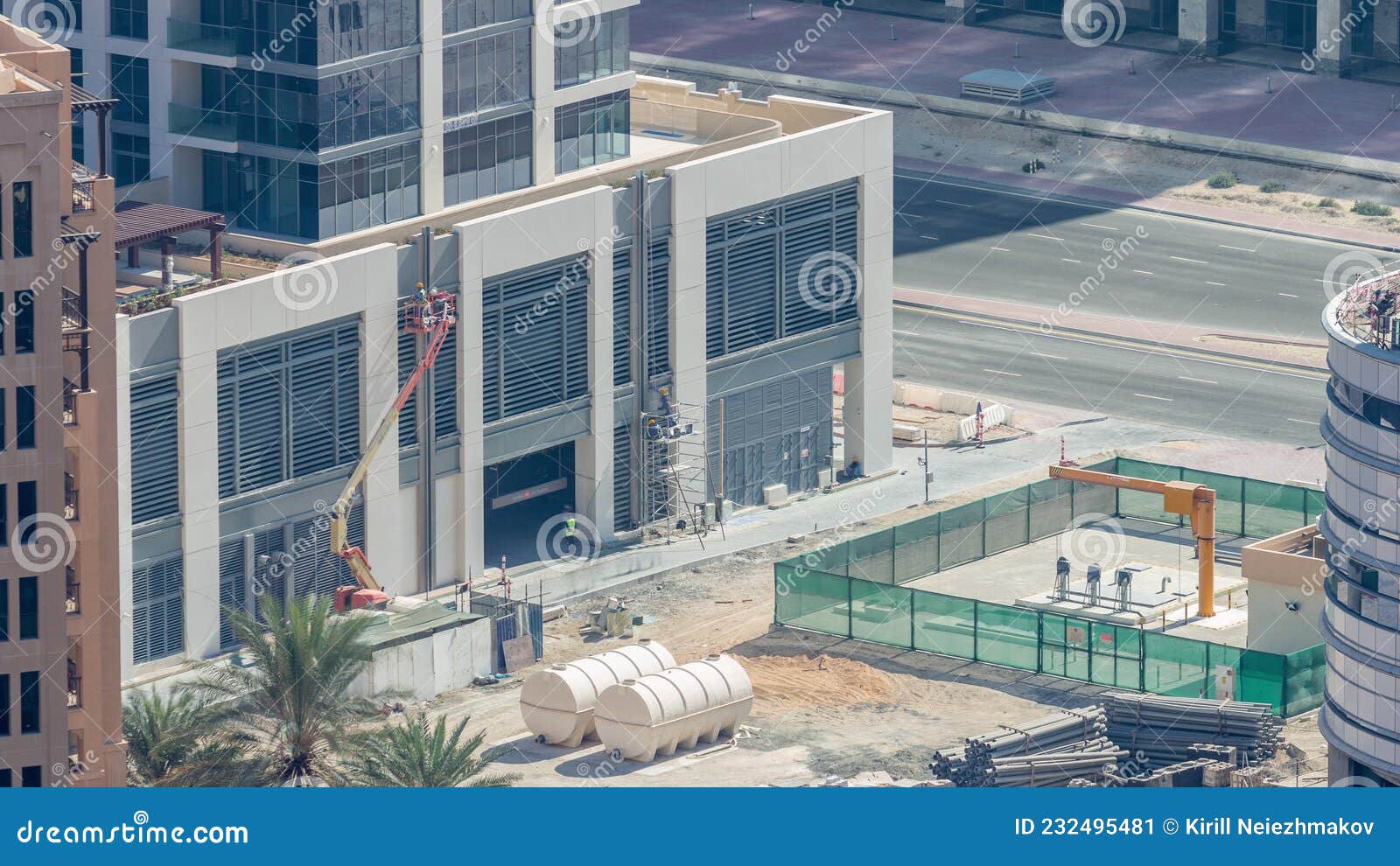 Builder on a Lift Platform on a Construction Site Timelapse. Man at ...