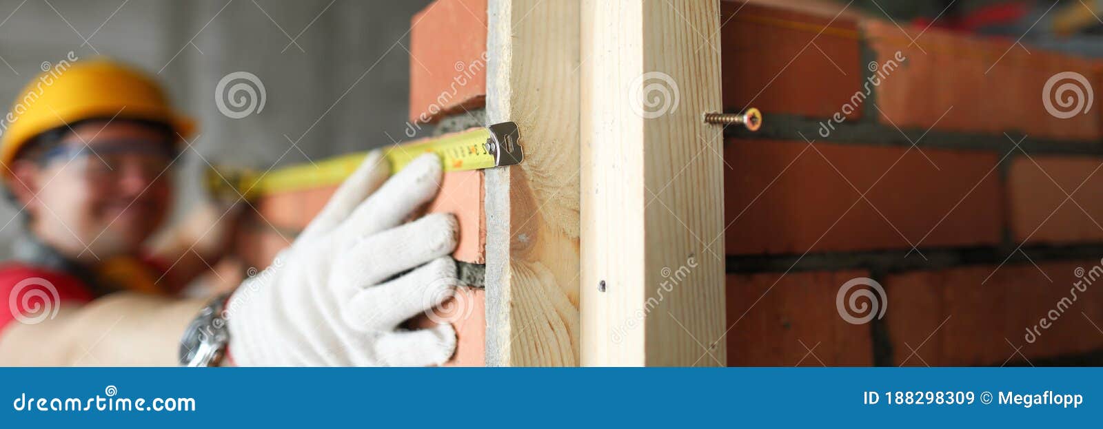Builder Taking Tape Measure on Brick Wall Close Up Stock Image - Image ...