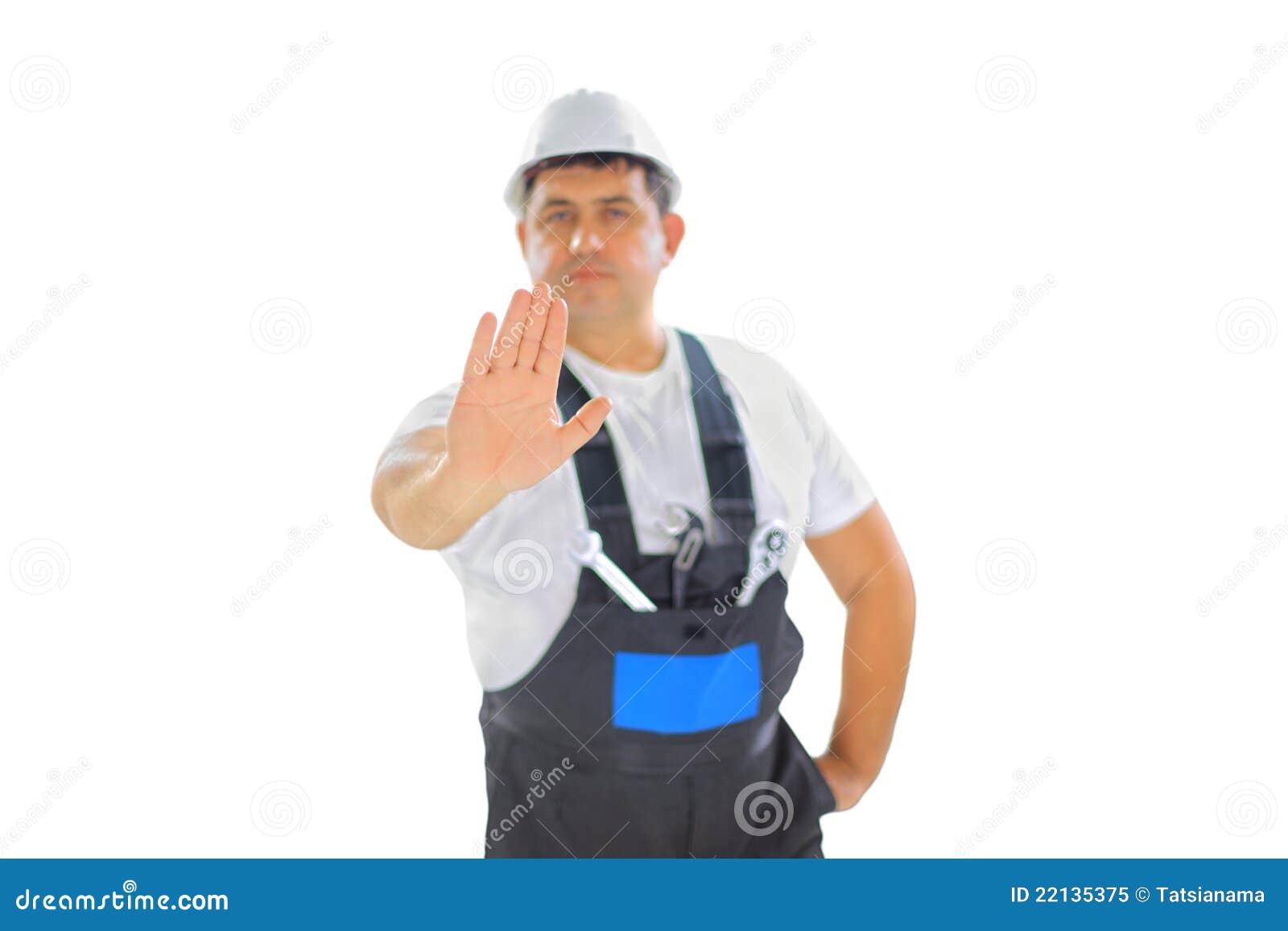 Builder making stop sign stock image. Image of showing - 22135375