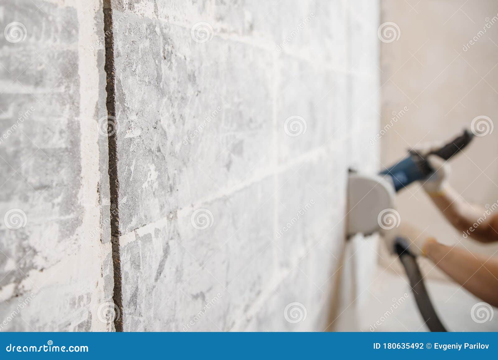 Builder Man Cutting Electrical Chase in Concrete Wall with Groove ...