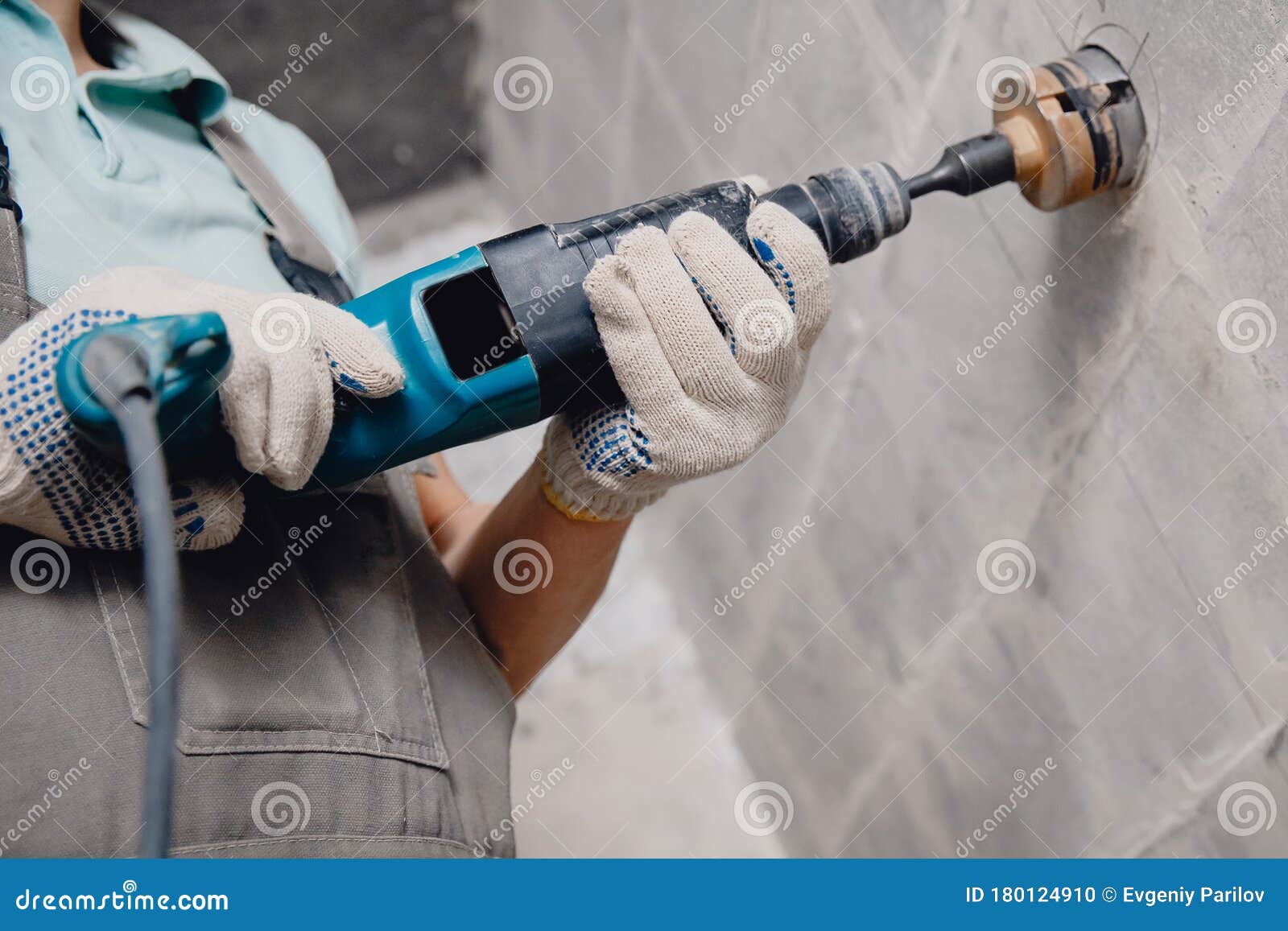 Builder Man Cutting Electrical Chase in Concrete Wall with Hammer Drill ...