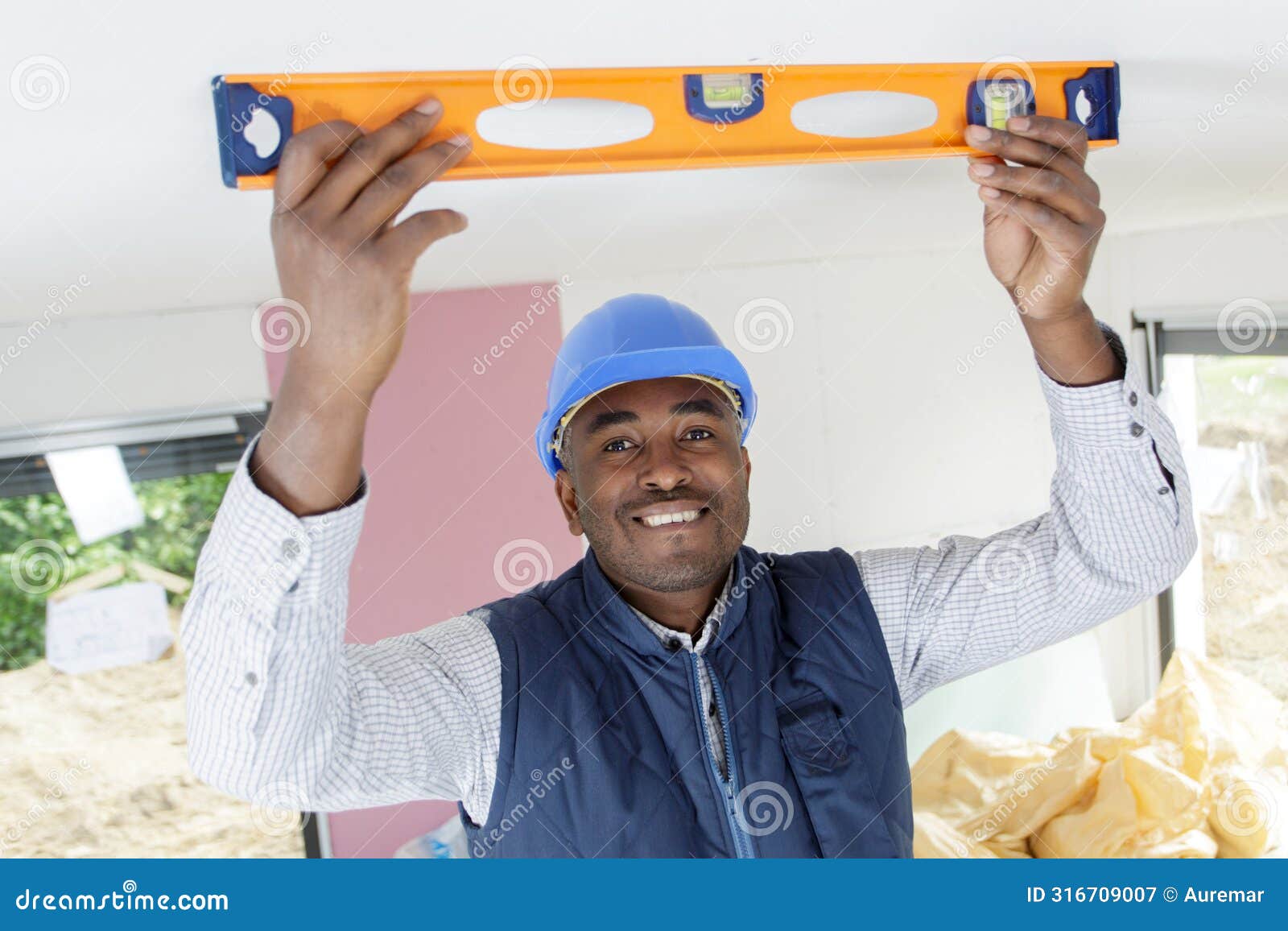 Builder man holding level stock image. Image of media - 316709007