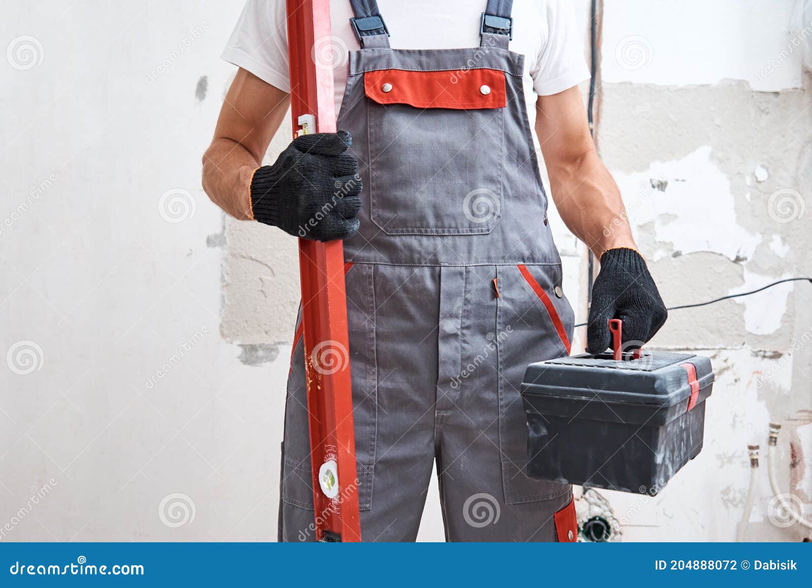 Builder Man in Uniform with Construction Tools. Repair Concept Stock ...