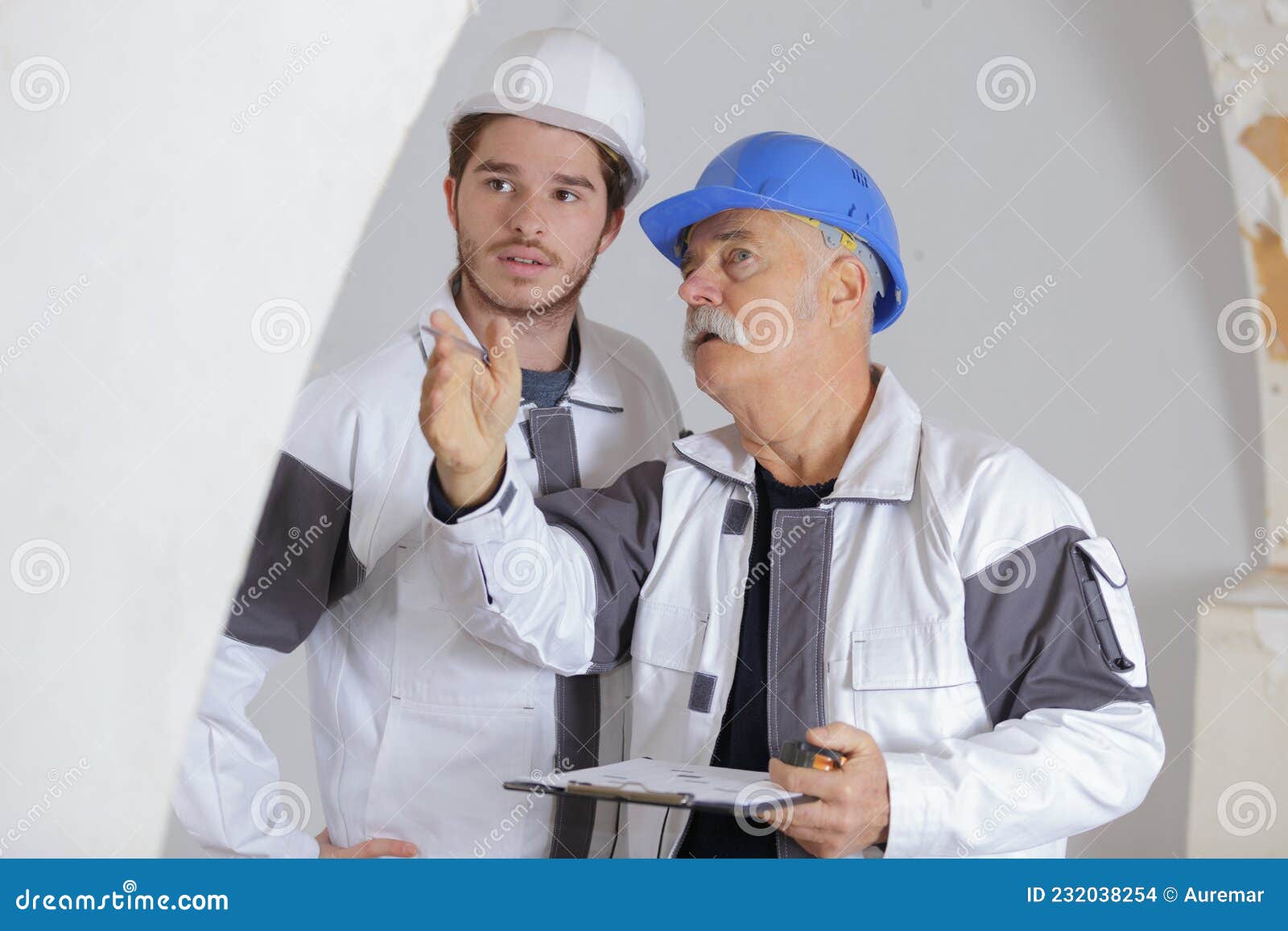 Builder Manager Giving Instructions Stock Photo - Image of handsome ...
