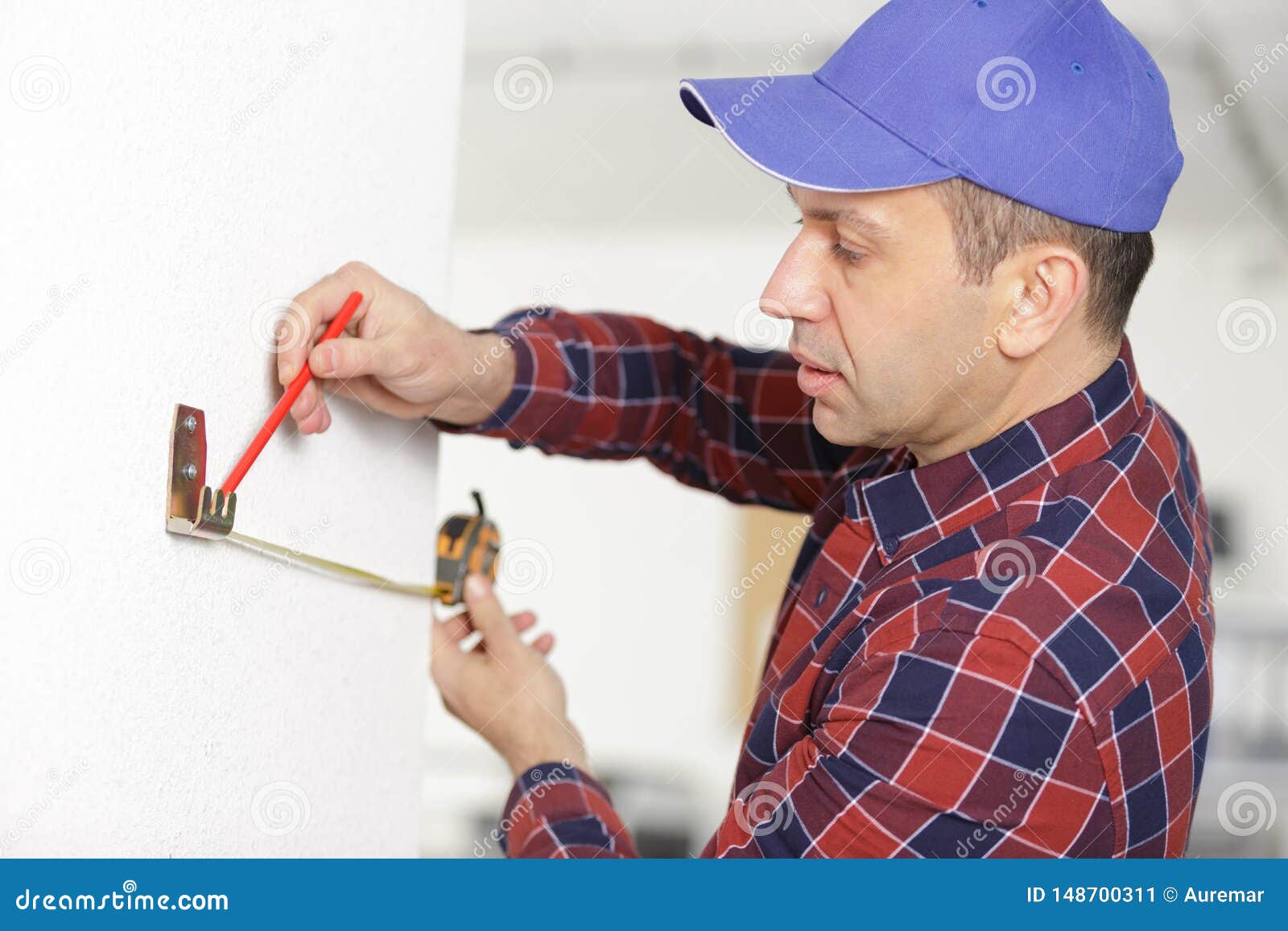 Builder Marks on Wall with Ruler and Pencil Stock Image - Image of ...