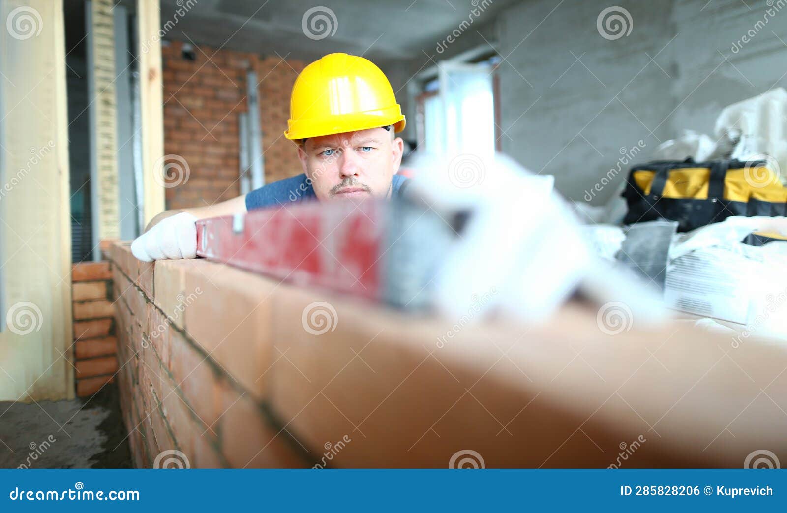 Builder Measures Level of Brickwork with Device Stock Photo - Image of ...