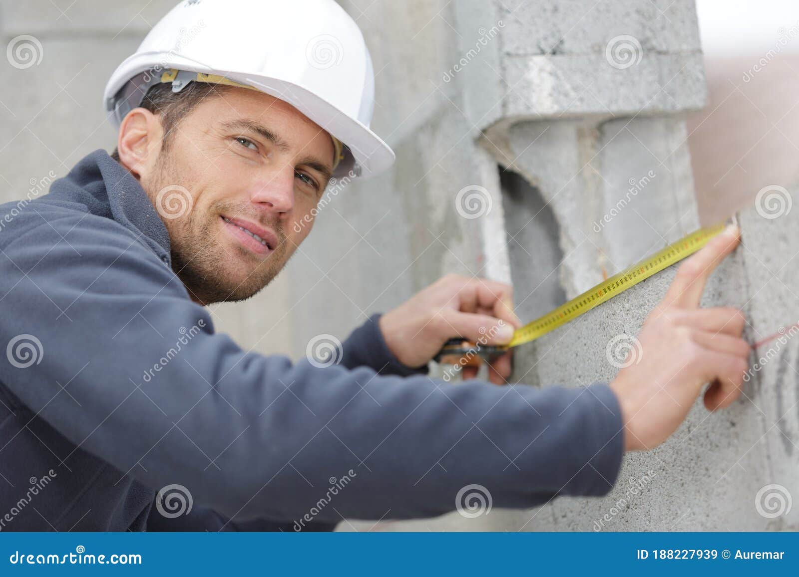 Builder Measures Wall Stock Image | CartoonDealer.com #188227939