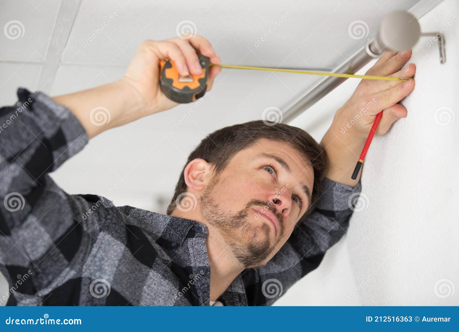Builder Measuring Curtain Rod Stock Image - Image of installing, shadow ...