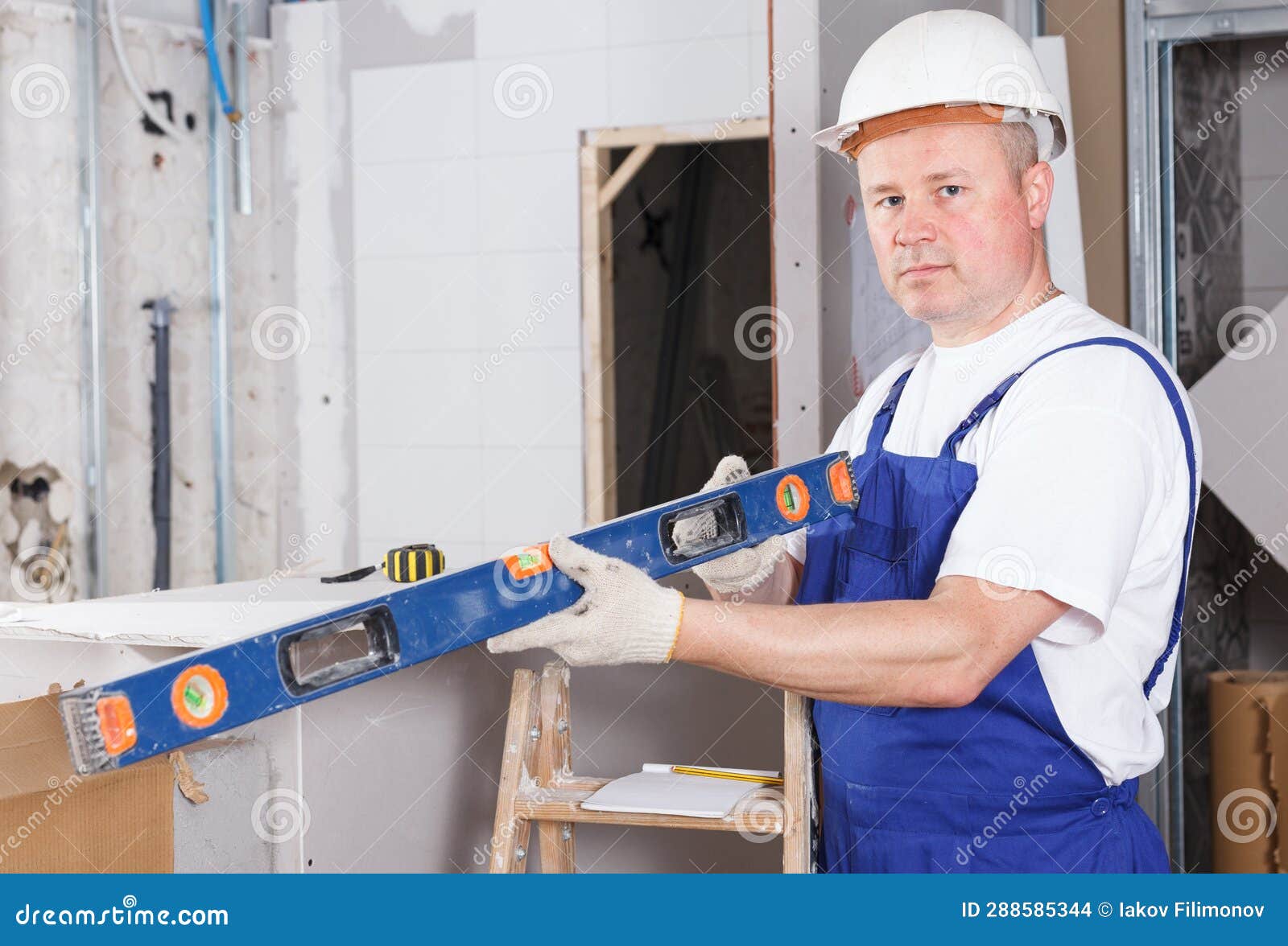 Builder Measuring Drywall Construction Stock Photo - Image of equipment ...