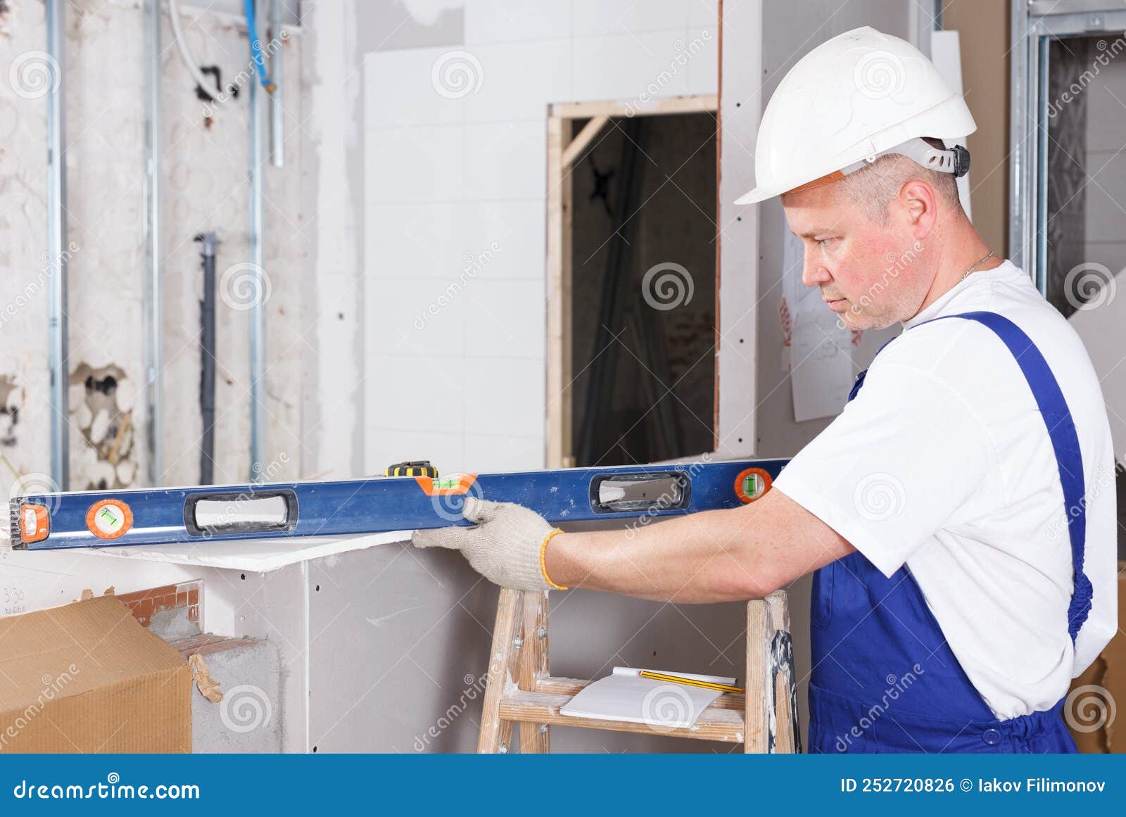 Builder Measuring Drywall Construction Stock Photo - Image of service ...