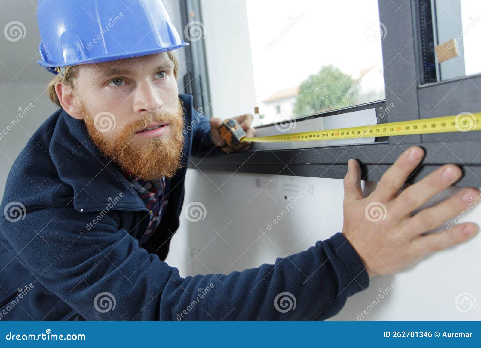 Builder Measuring Window Using Retractable Tape Measure Stock Photo ...