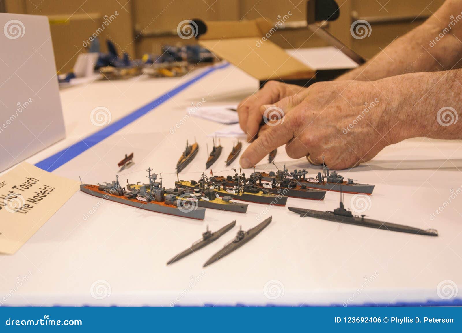 Builder of Model Ships Sets Up His Display at the Modeling Convention ...