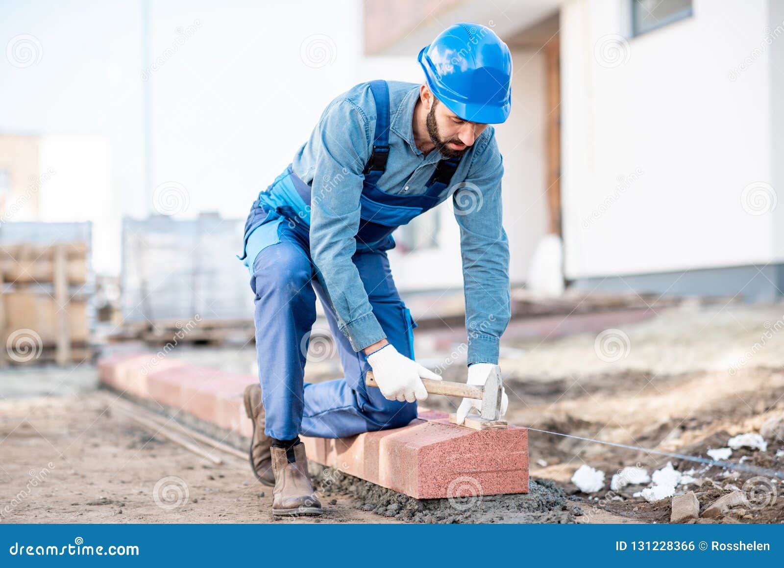 Builder Mounting Road Borders Stock Photo - Image of blue, path: 131228366