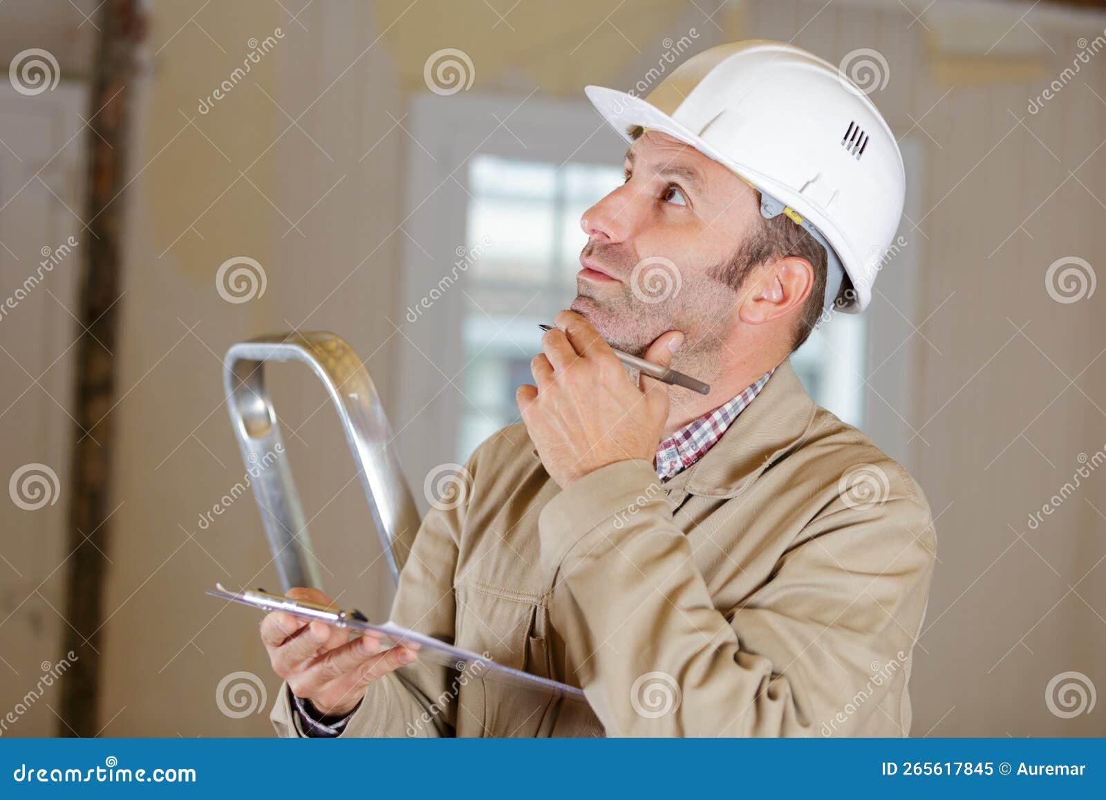 Builder next to ladder stock image. Image of improvement - 265617845