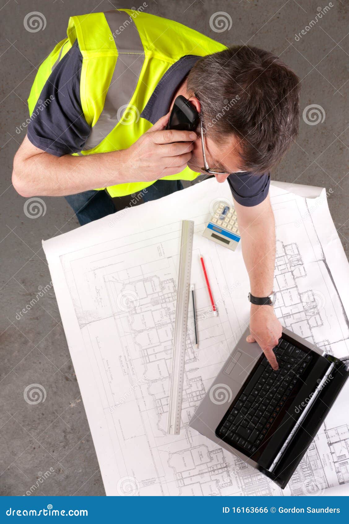 Builder Phones about Construction Blueprint Stock Photo - Image of ...