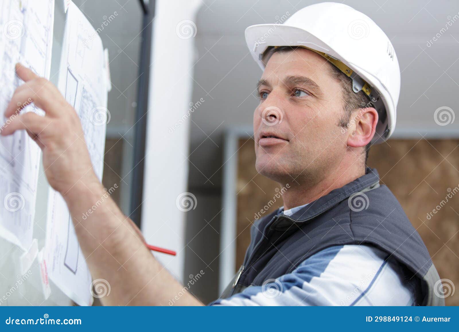 Builder Planning with Serious Expression Stock Photo - Image of white ...
