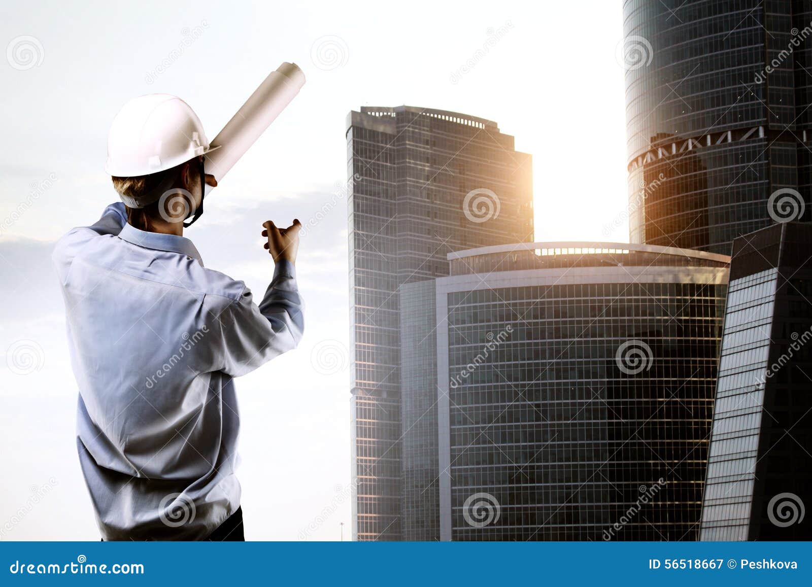Builder Pointing at Skyscraper Stock Image - Image of contemporary ...