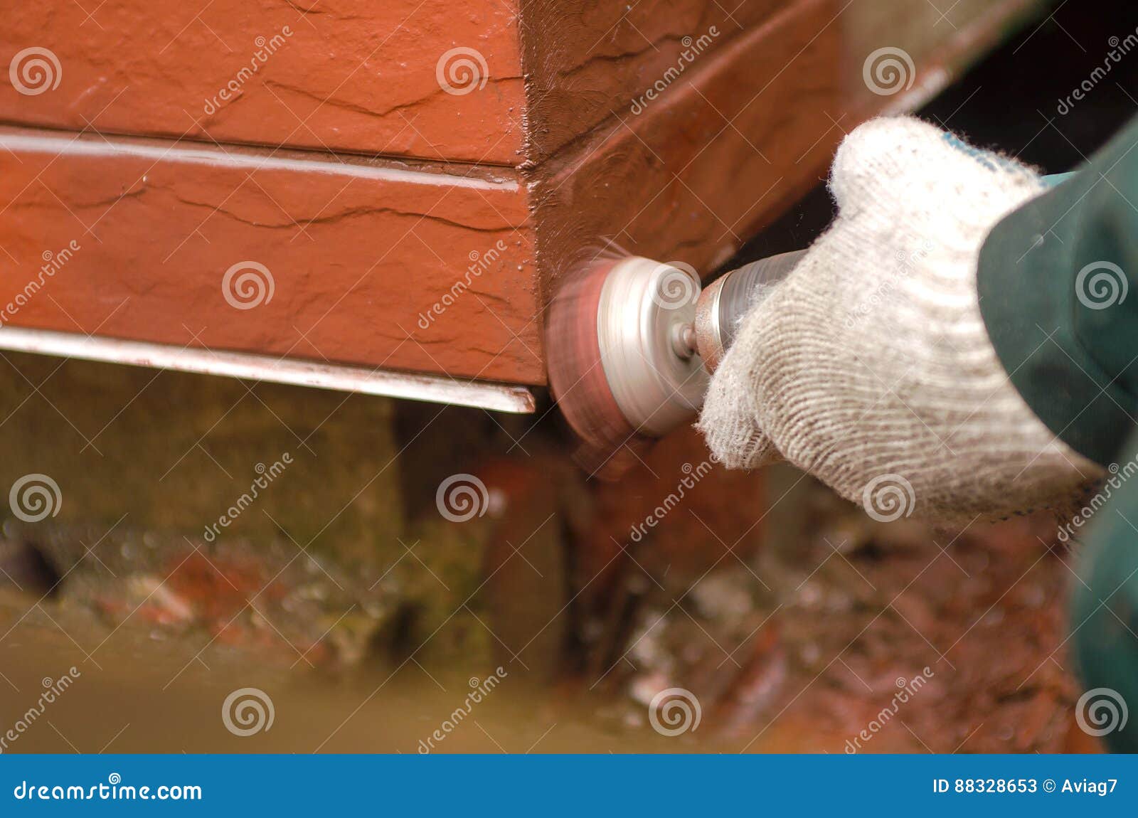Builder Polishing the Red Wall Stock Image - Image of machine ...