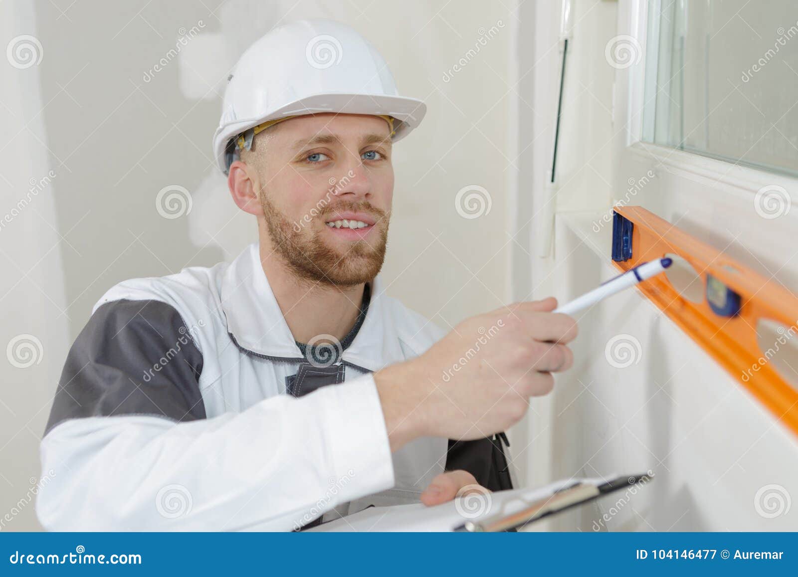 Builder Posing and Pointing To Spirit Level Stock Image - Image of flat ...