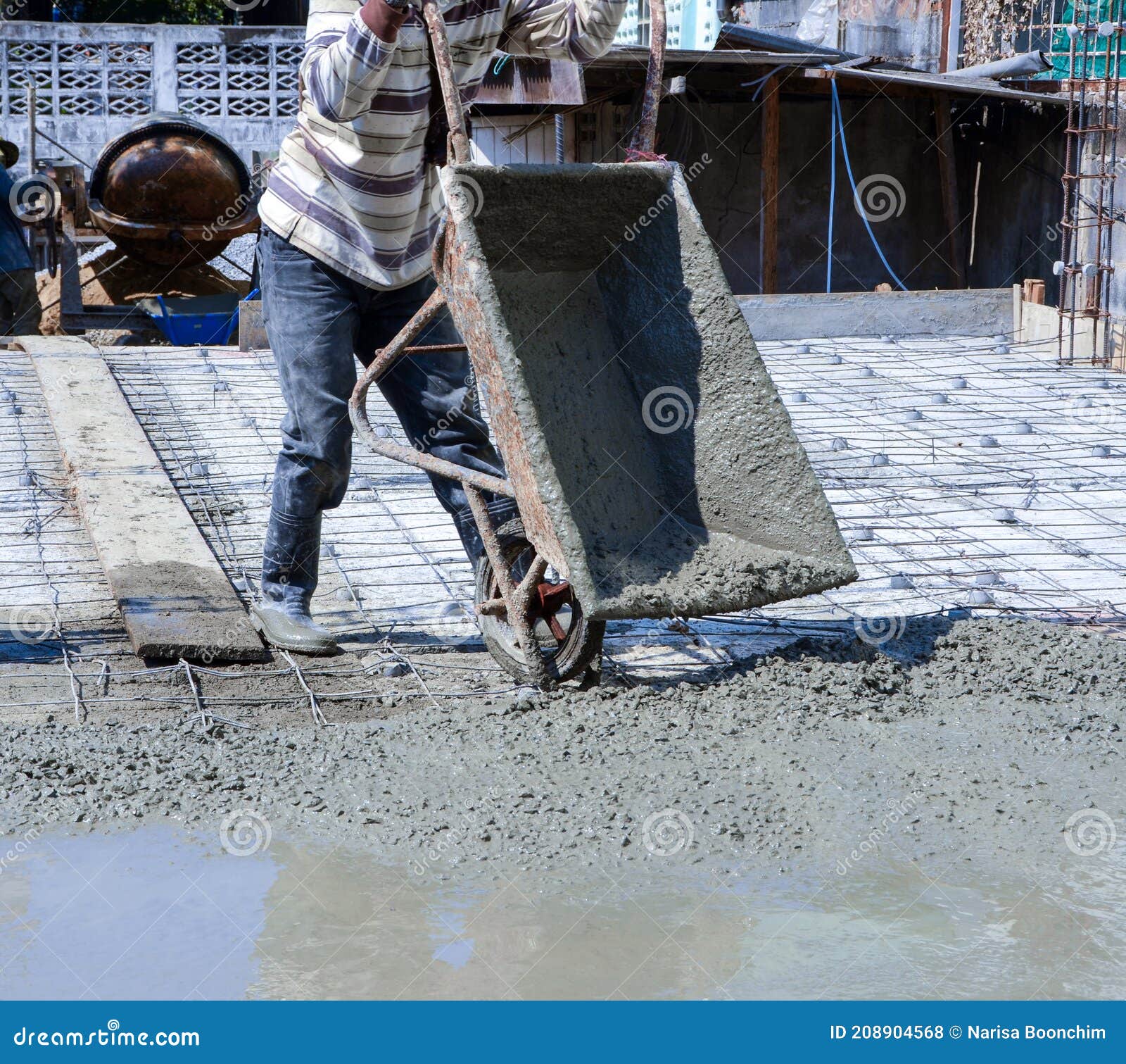 Workers are Cementing Cement on the Floor of Reinforced Concrete ...
