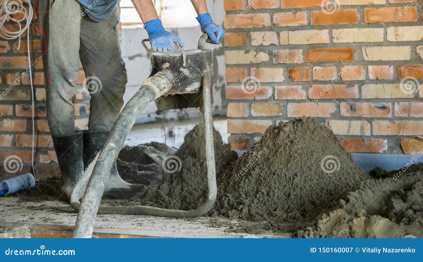 The Builder Puts a Semi-dry Mortar for Finishing the Floor Stock Image ...