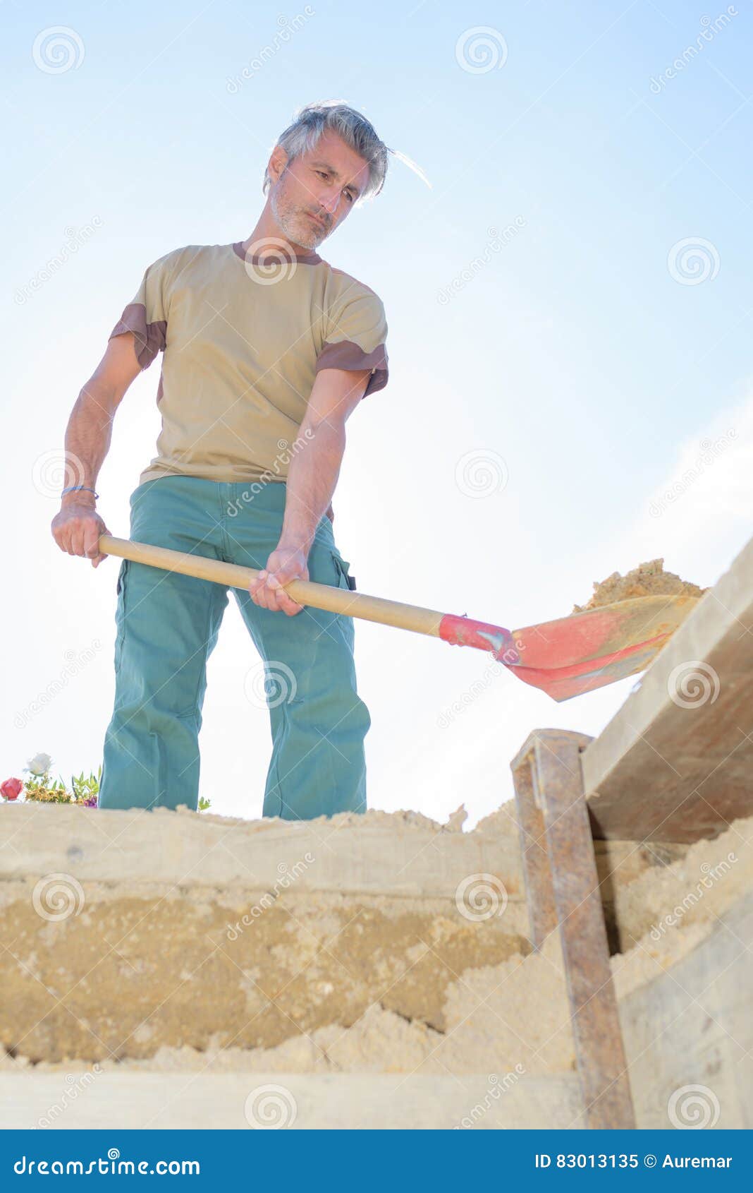 Builder Putting Sand in Hole Stock Image - Image of employee, local ...