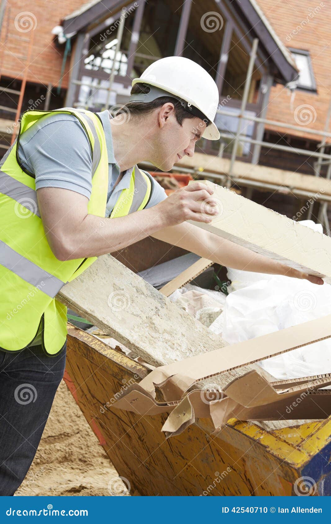 Builder Putting Waste into Rubbish Skip Stock Photo - Image of skip ...