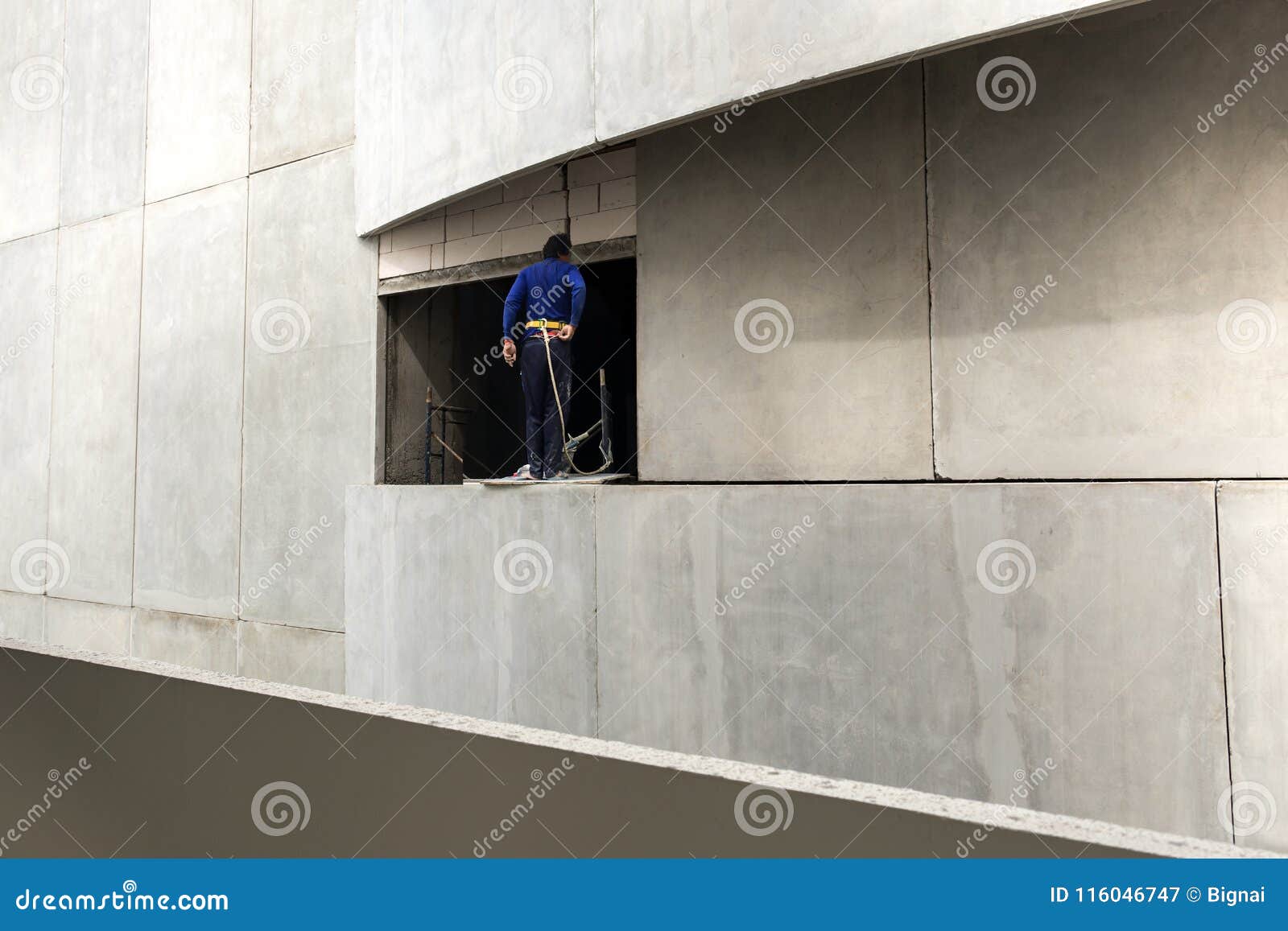 Builder with Rope at High Building Editorial Photography - Image of ...