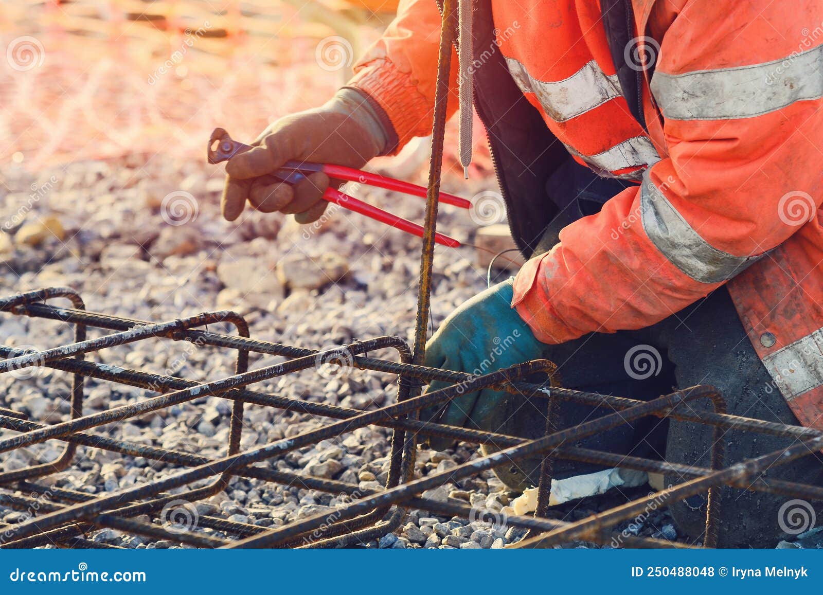 Builder`s Hands Fixing Steel Reinforcement Bars at Construction Site ...