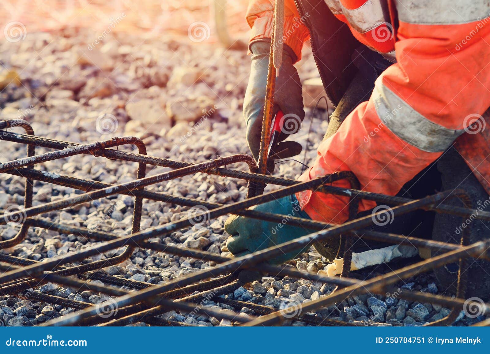 Builder`s Hands Fixing Steel Reinforcement Bars at Construction Site ...