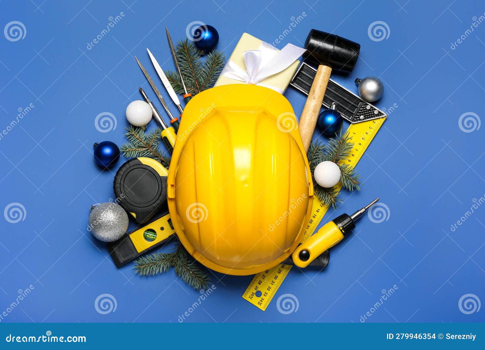 Builder S Tools with Christmas Decor and Gift on Blue Background Stock ...