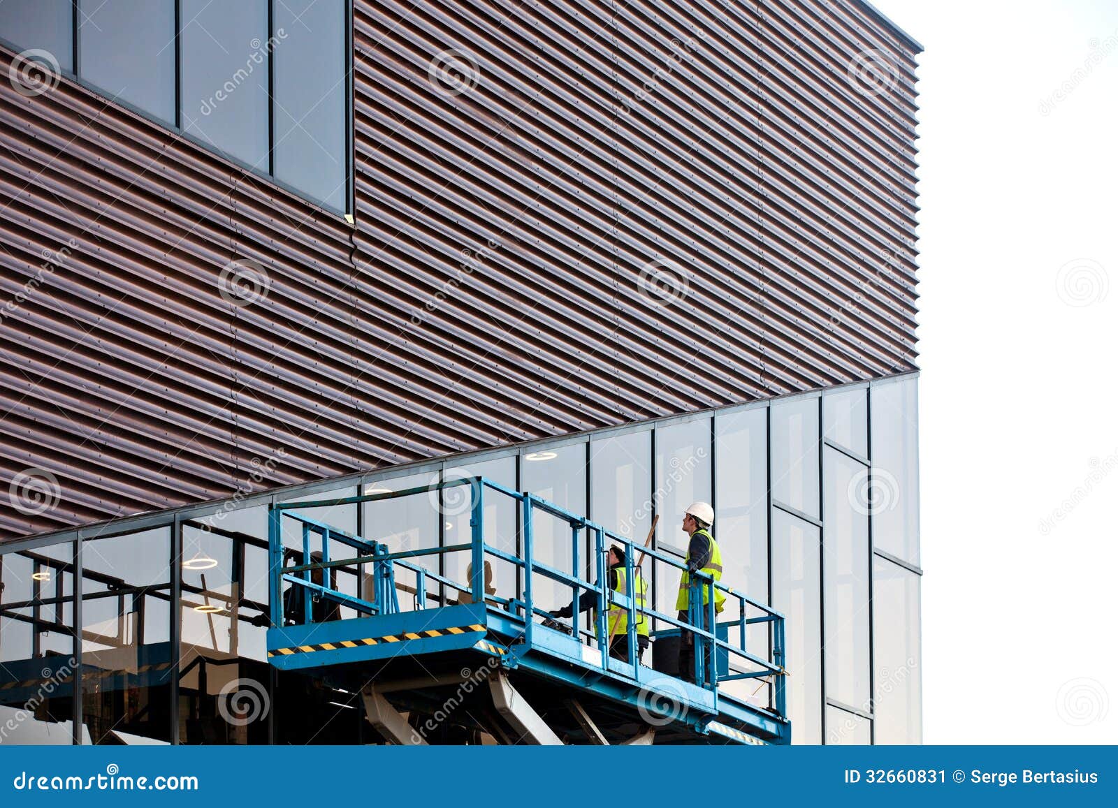 Builder on a Scissor Lift Platform at a Constructi Stock Image - Image ...