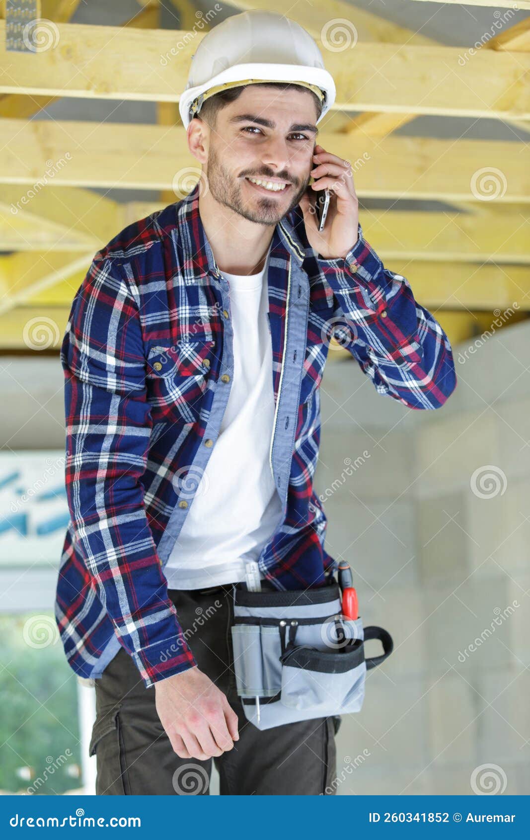 Builder on Site Using Mobile Phone Stock Photo - Image of tool, home: 260341852