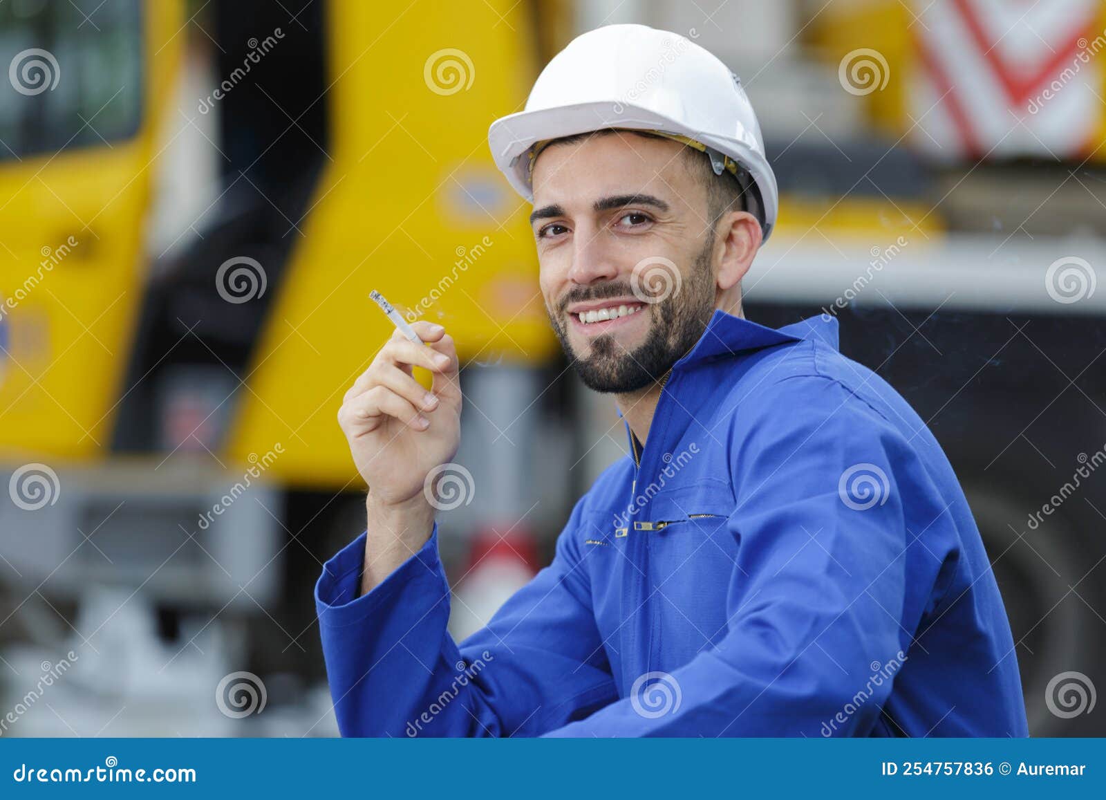 Builder Smoking Cigarette on Construction Site Stock Photo - Image of ...