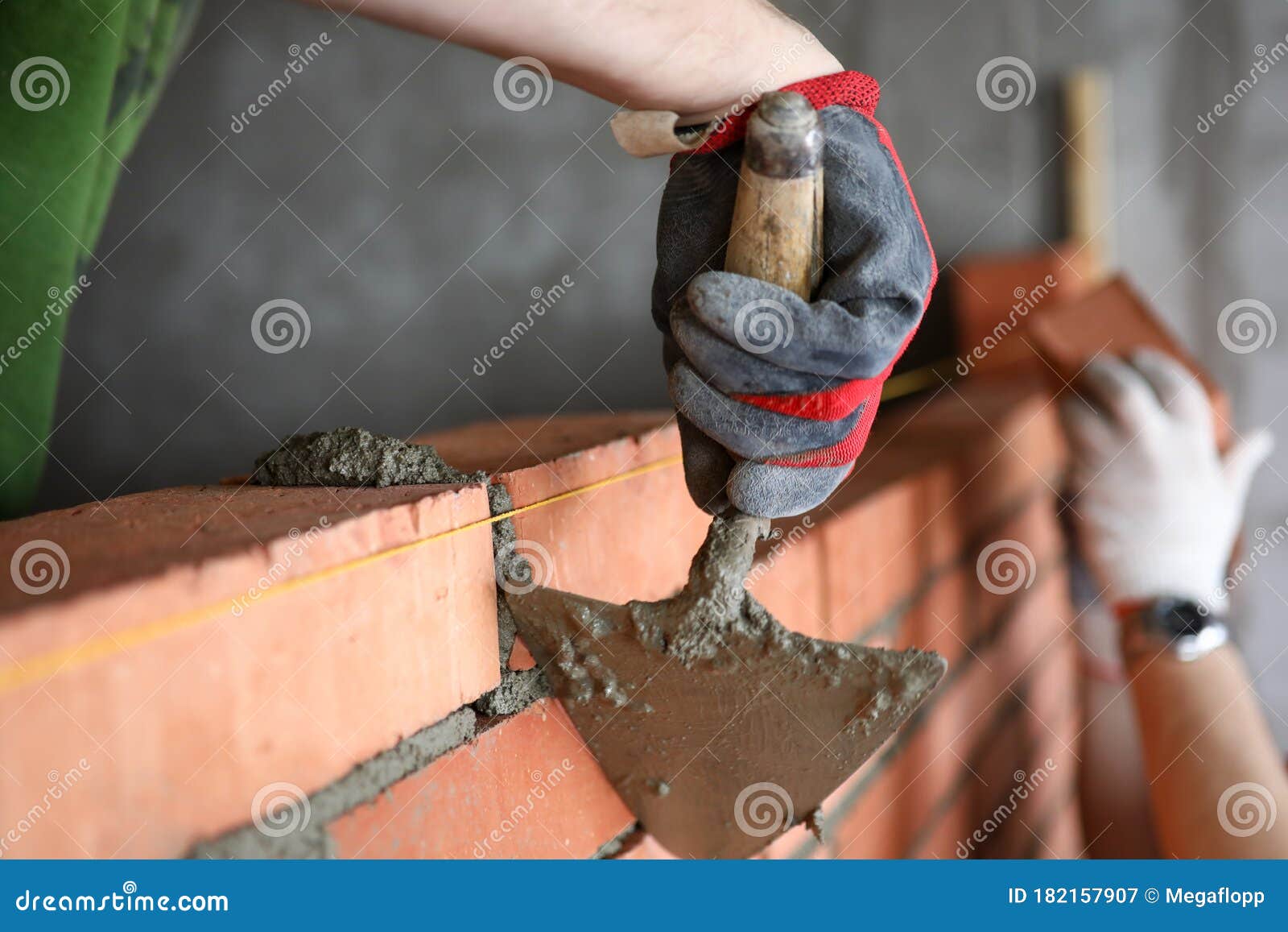 Builder with Spatula To Remove Excess Cement Stock Image - Image of ...