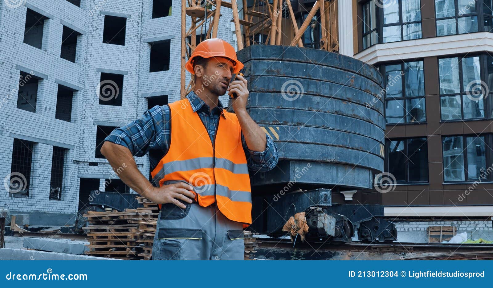 Builder Standing with Hand on Hip Stock Photo - Image of urban ...
