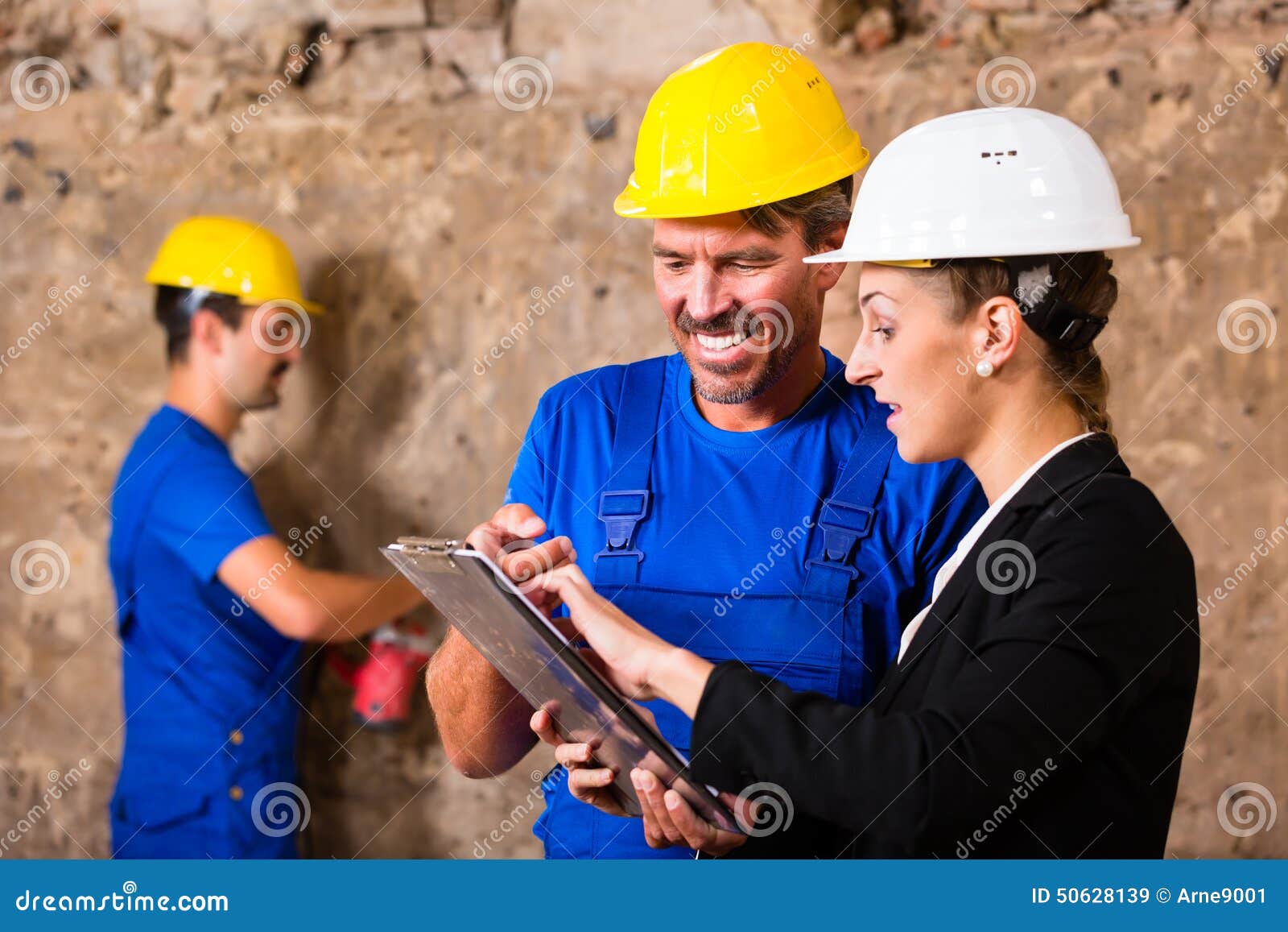 Builder and Supervisor on Construction Site Stock Image - Image of ...