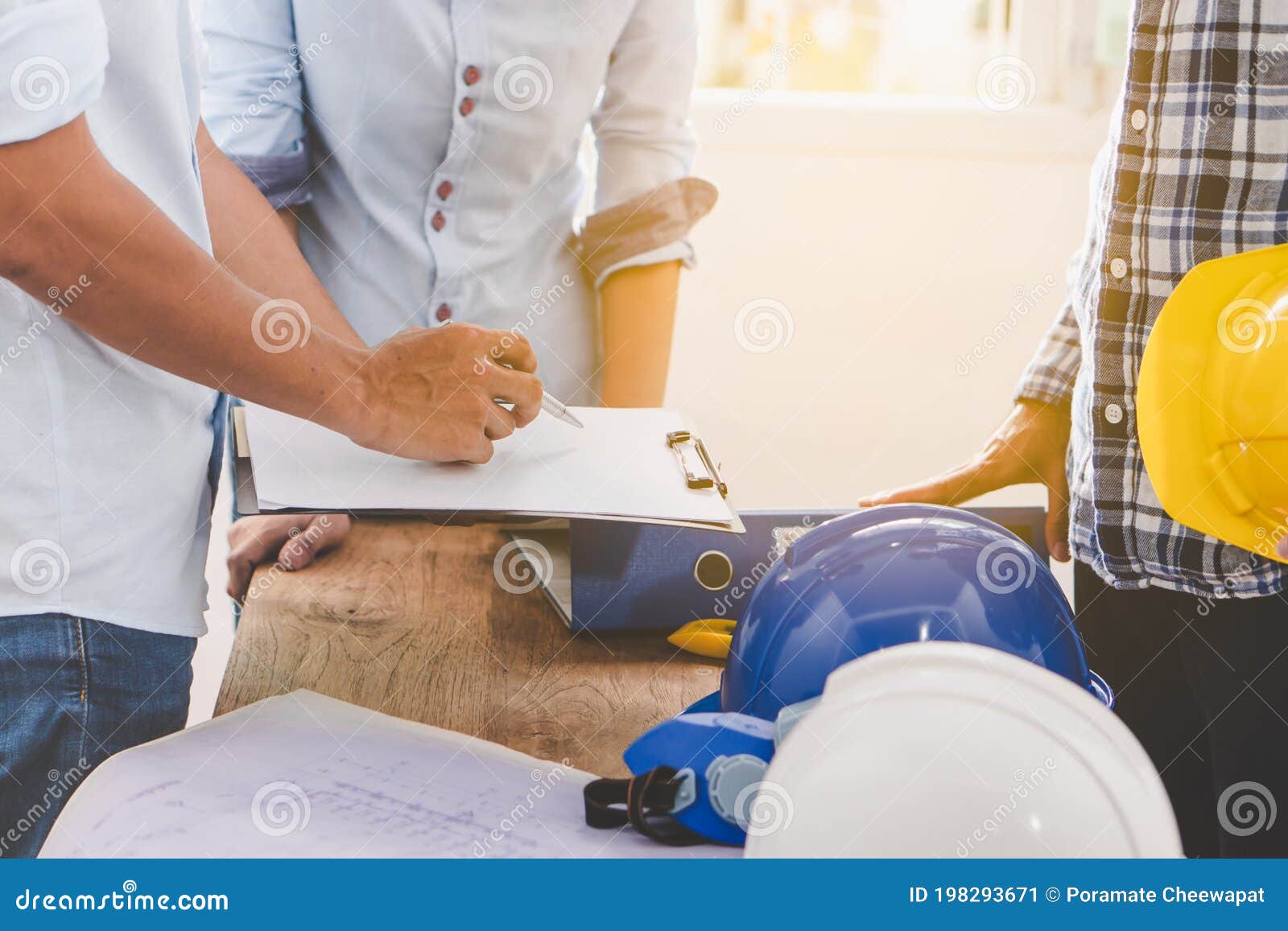 Builder Team Meeting and Planning for Renovation Office Project. Worker ...