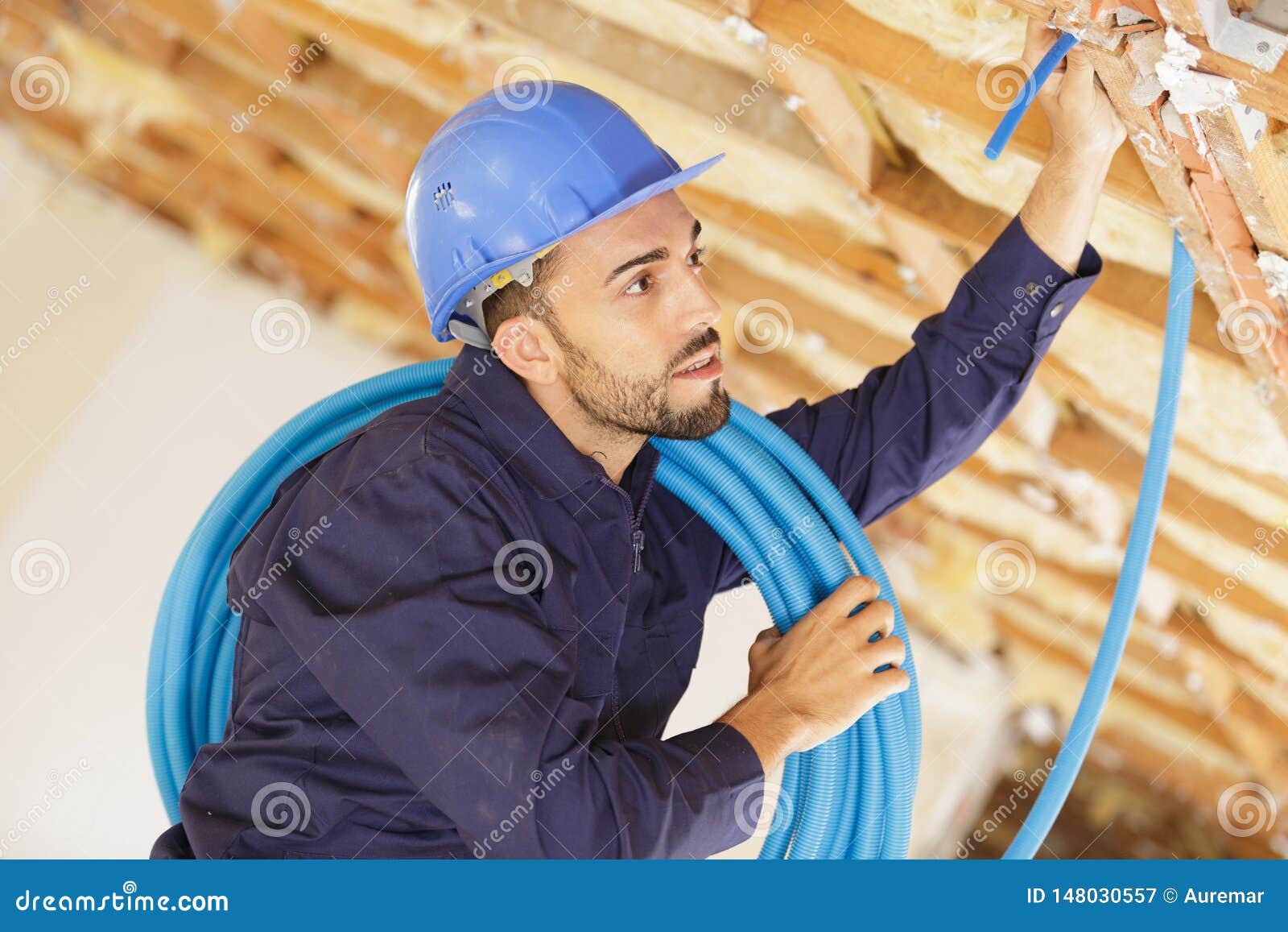 Builder Threading Cables through Wall Stock Image - Image of inside ...