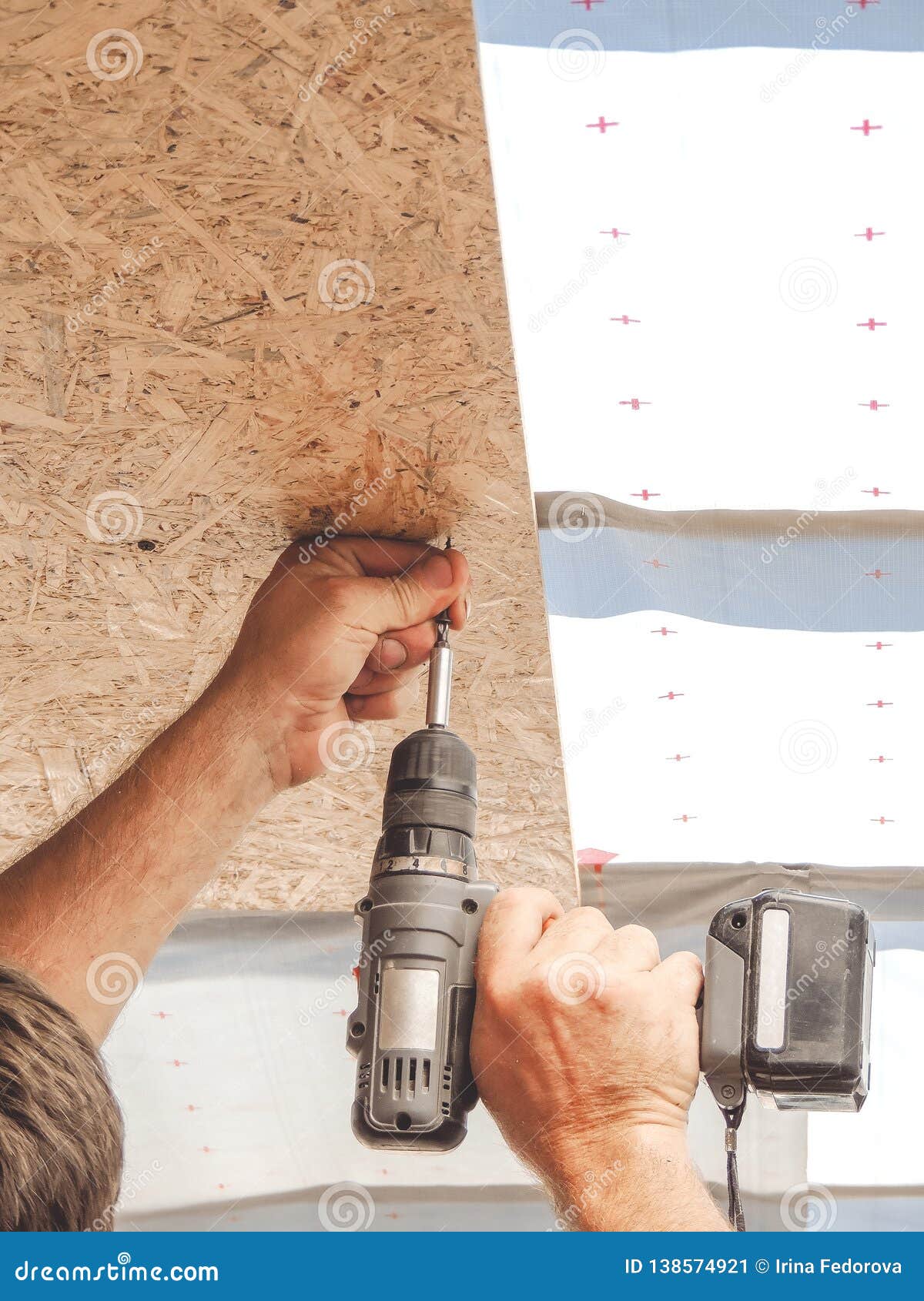 Builder Twists the in the OSB Sheet on the Ceiling Stock Image - Image ...