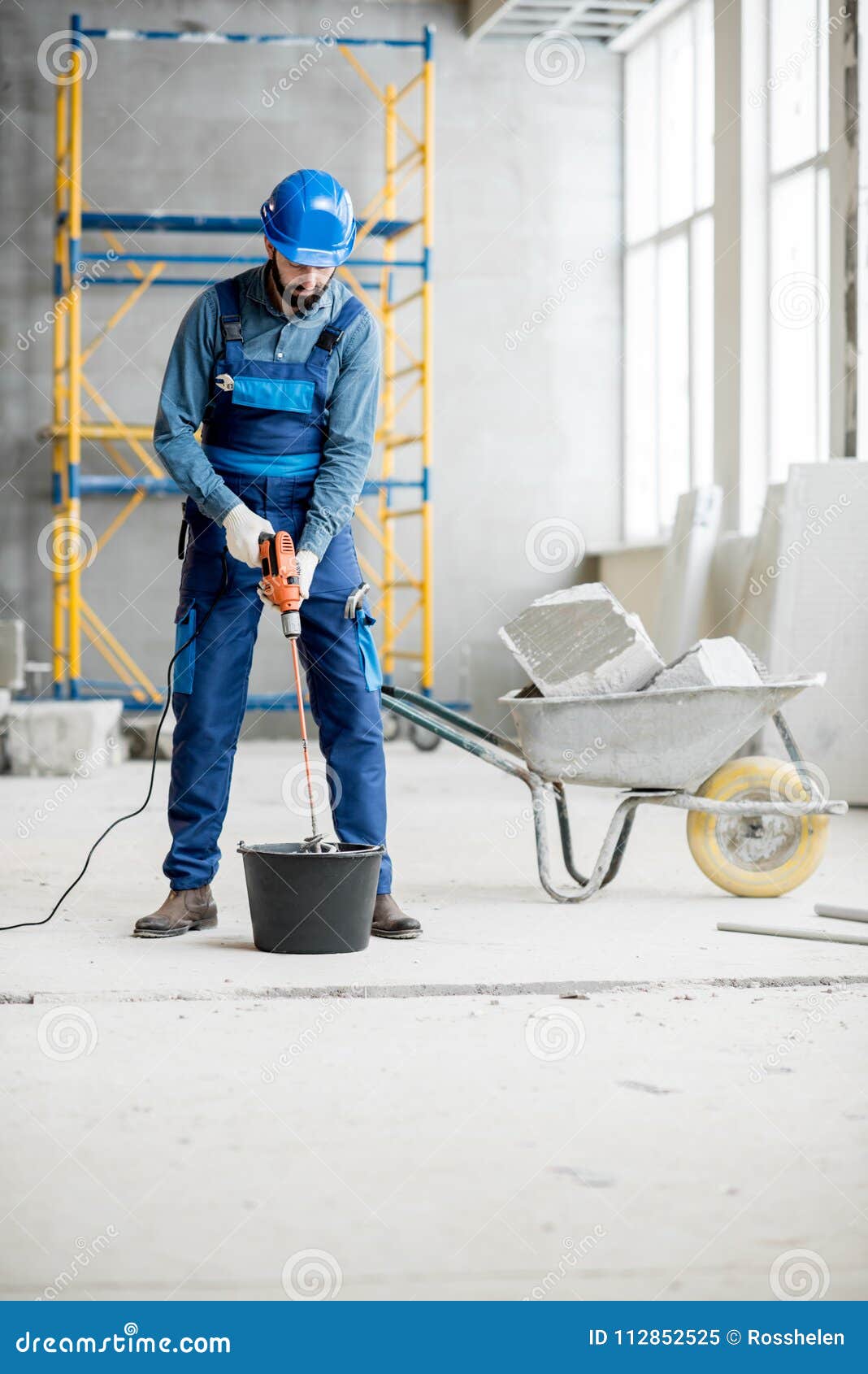 Builder Mixing Plaster at the Construction Site Stock Image - Image of ...