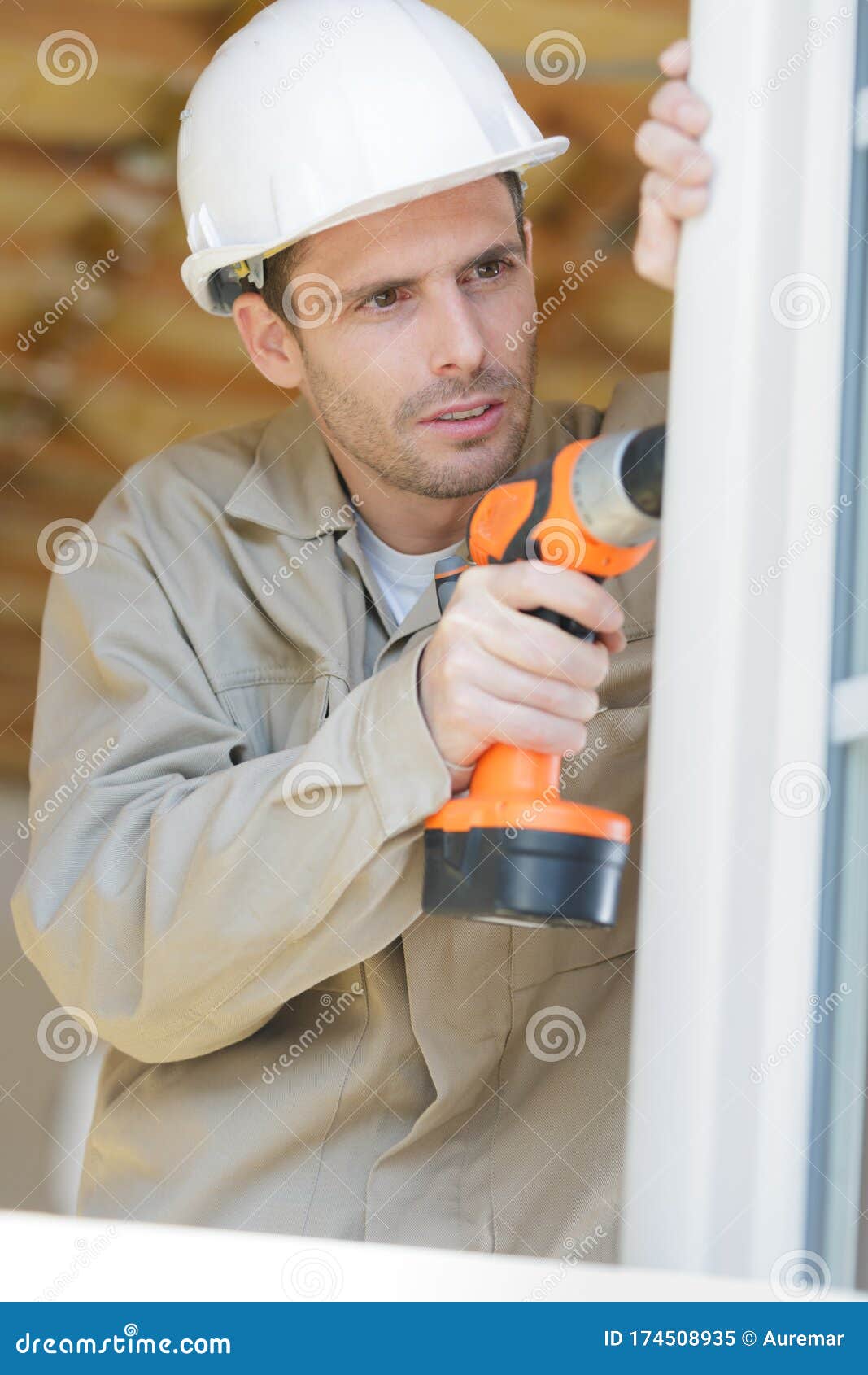 Builder Using Cordless Drill To Install Windows Stock Image - Image of ...